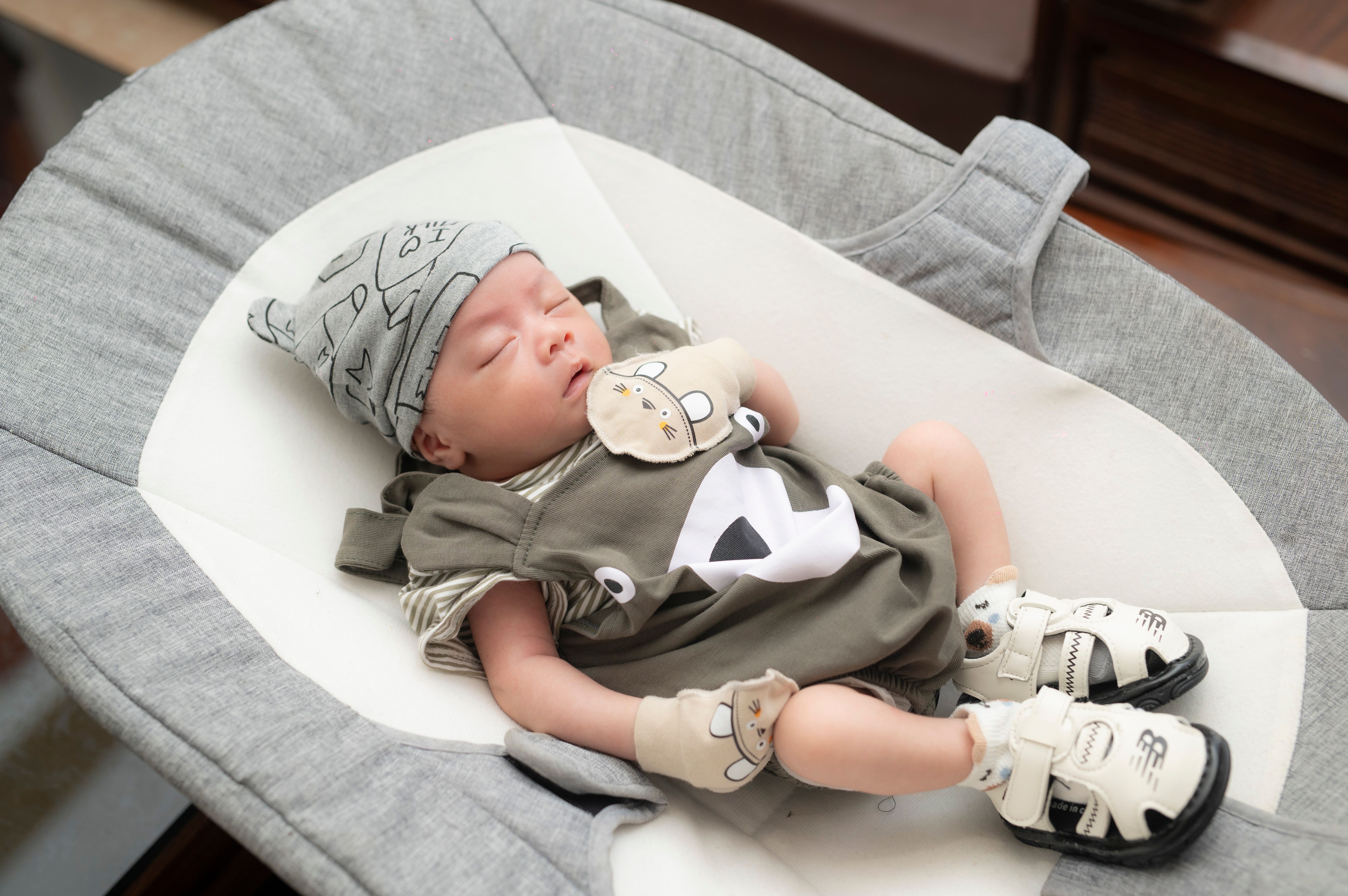 Adorable Sleeping Baby in Cozy Outfit at Home · Free Stock Photo