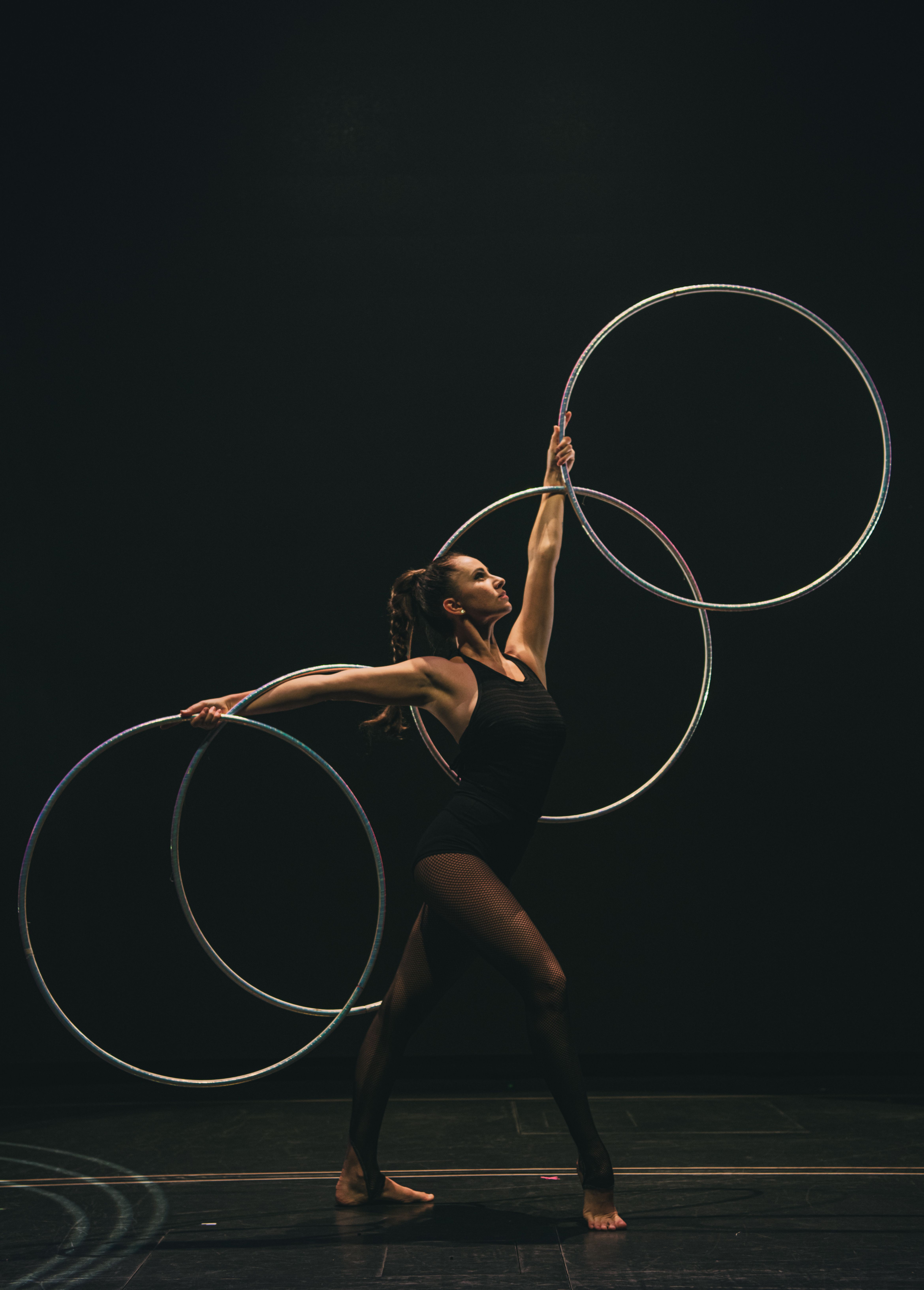 Graceful Hoop Dancer Performing Artistry · Free Stock Photo
