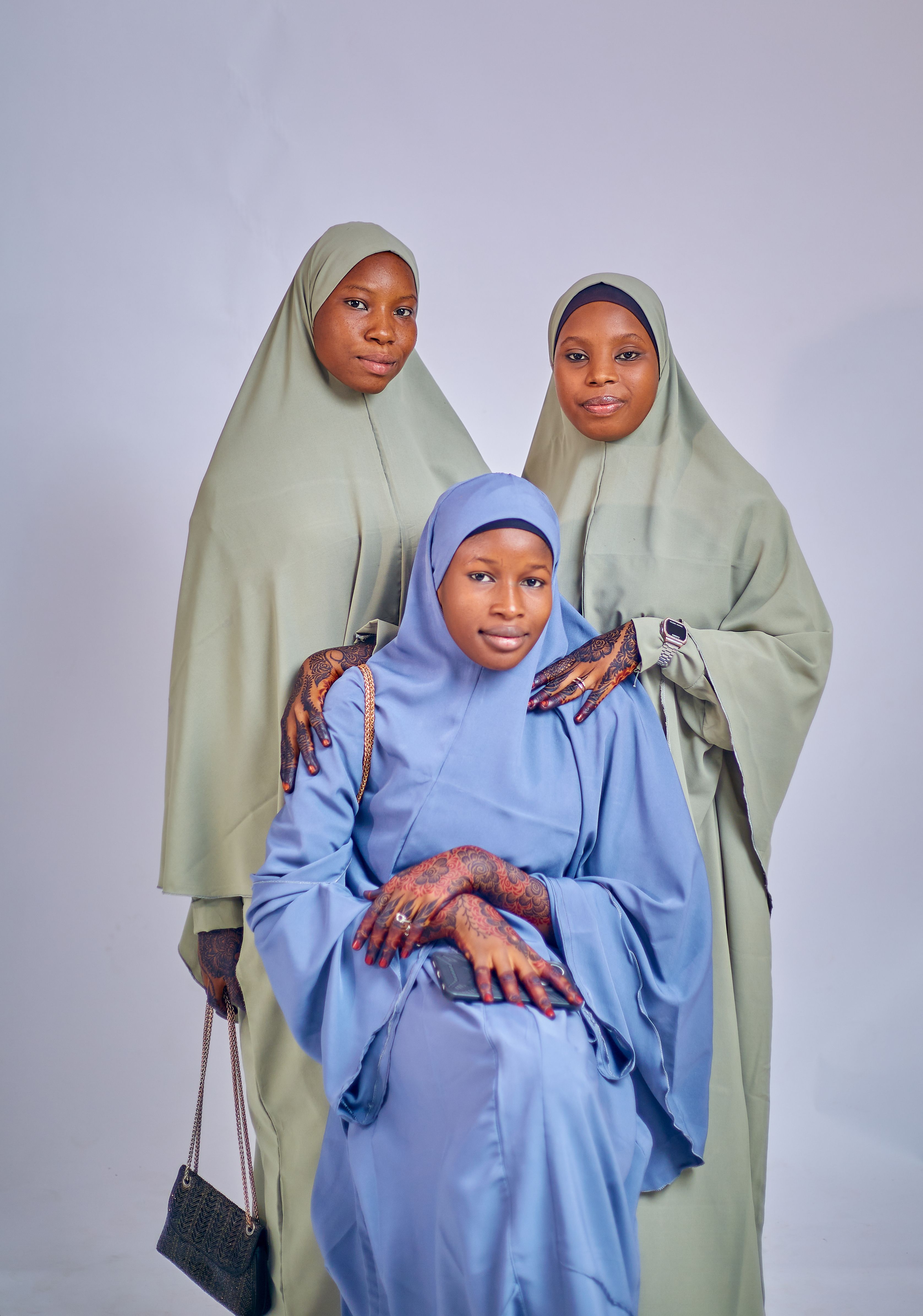 Portrait of Three Women in Hijab with Henna Designs · Free Stock Photo