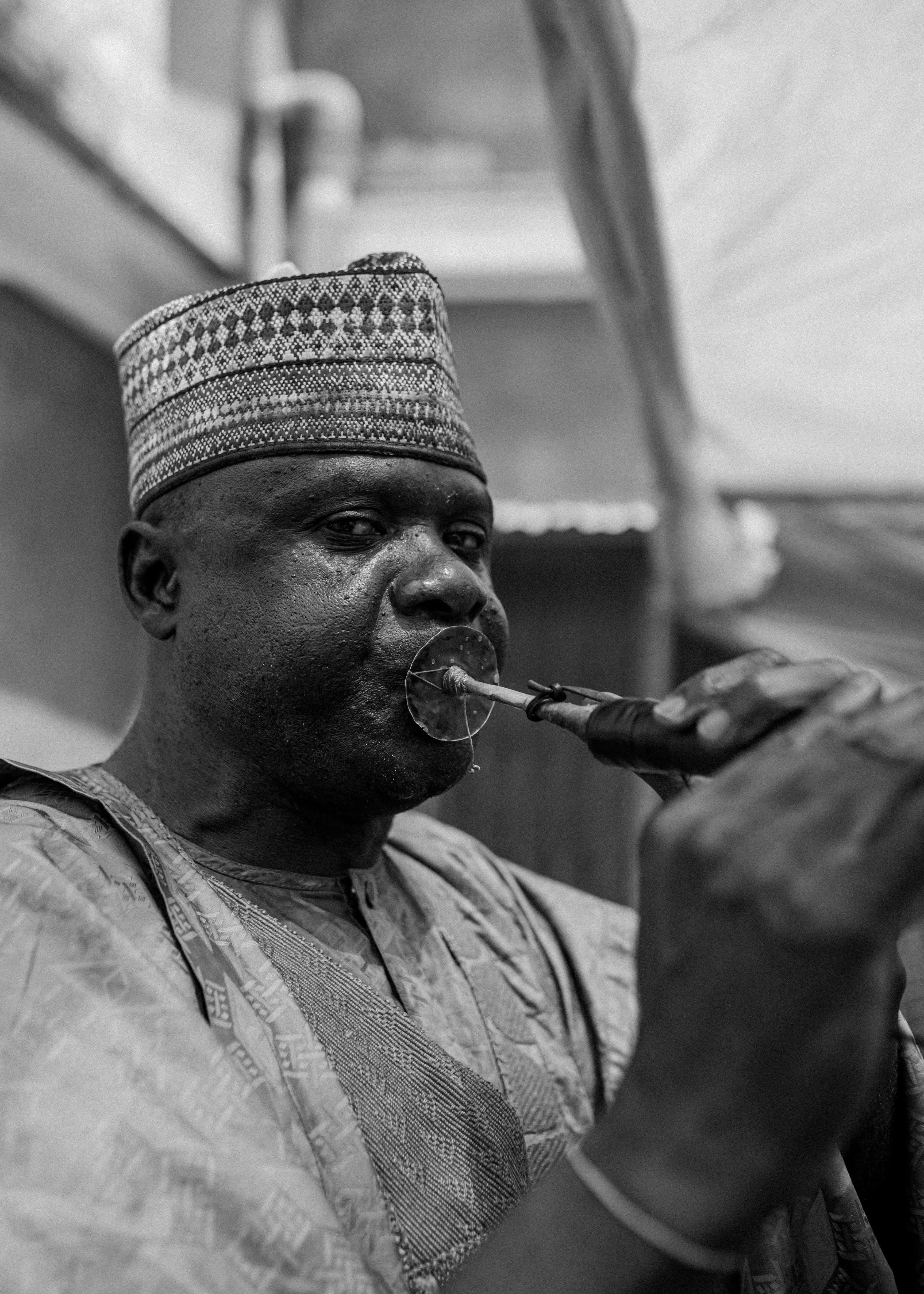 African Man Playing Traditional Wind Instrument · Free Stock Photo