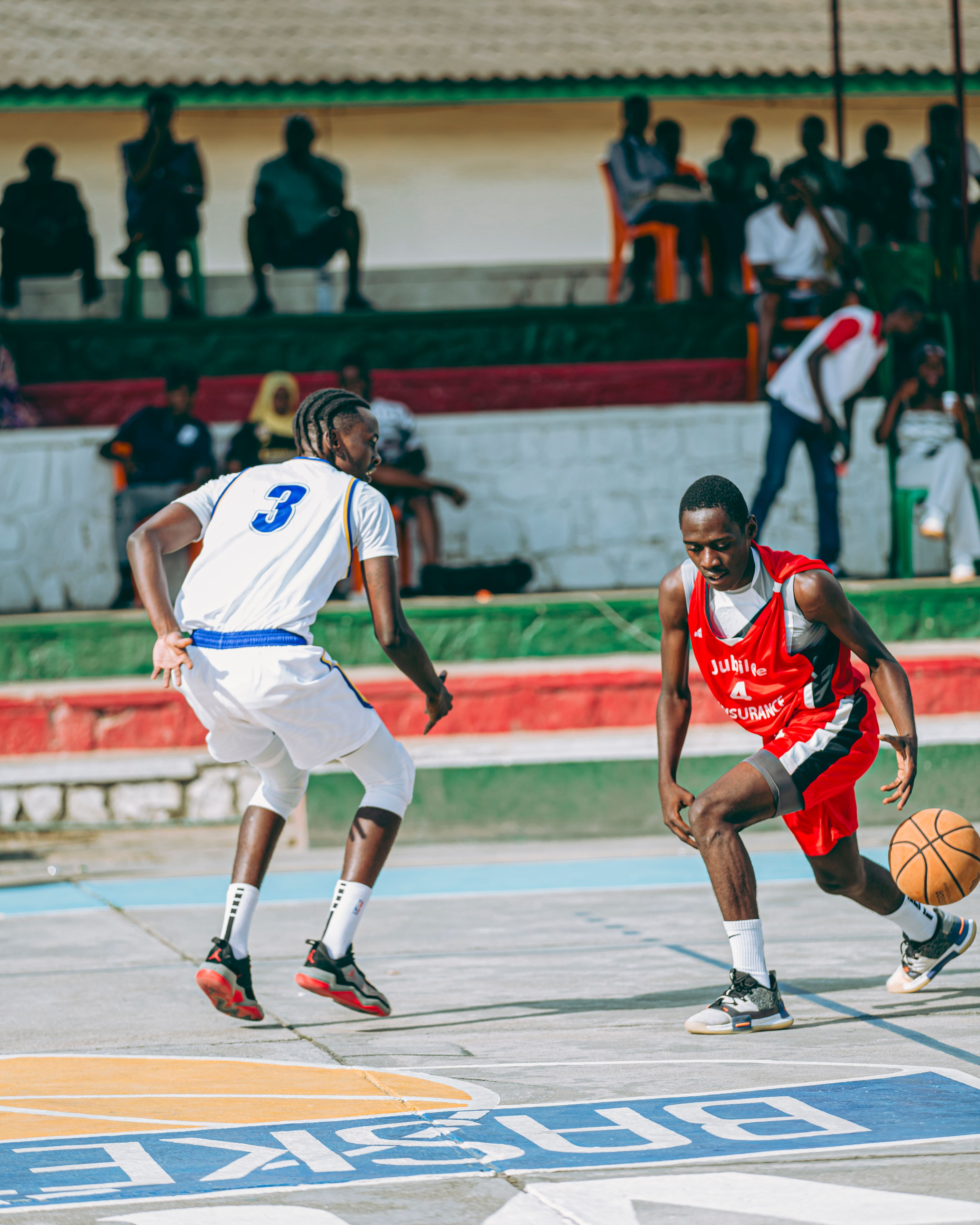 Competitive Outdoor Basketball Game Action · Free Stock Photo