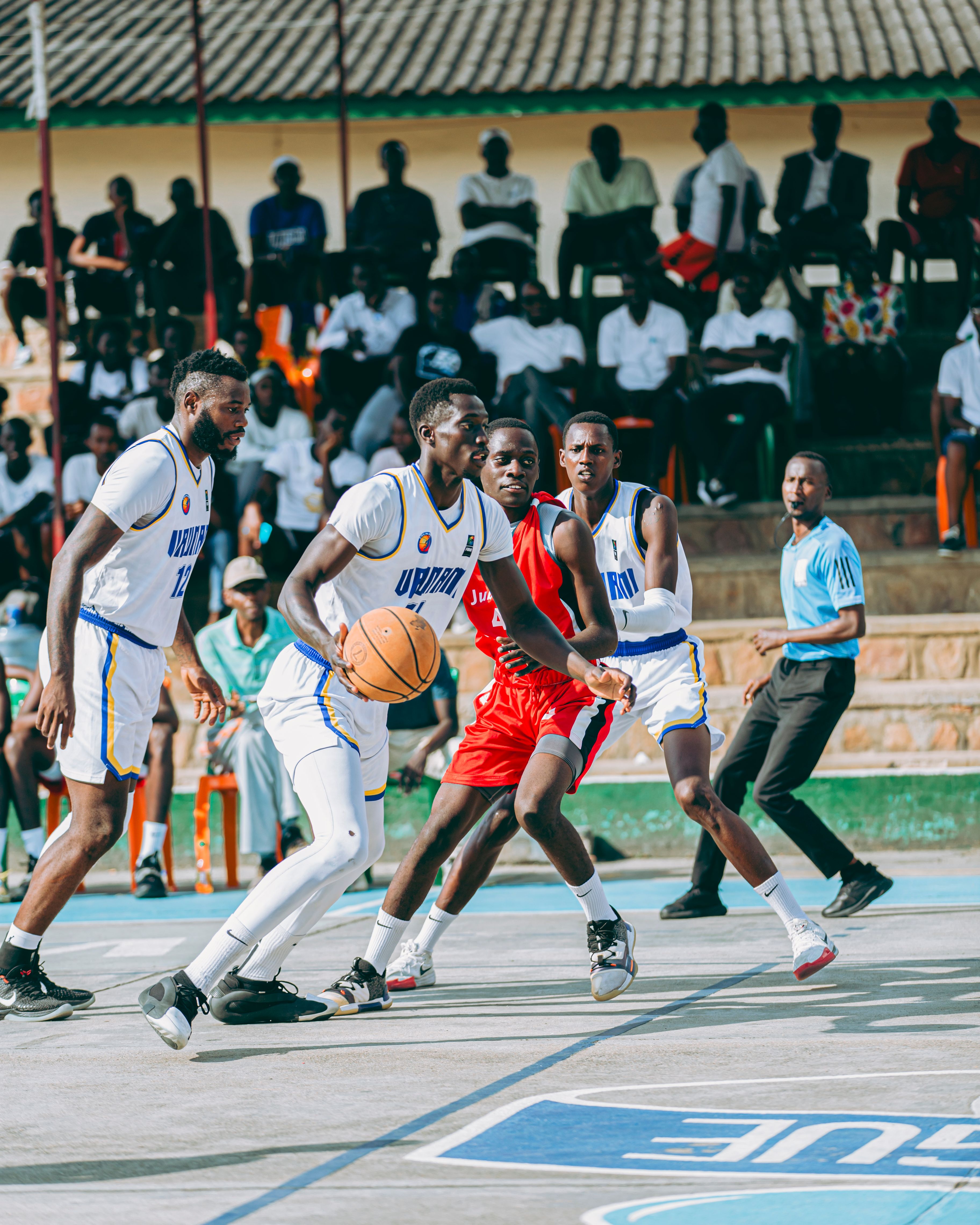 Intense Outdoor Basketball Game in Action · Free Stock Photo