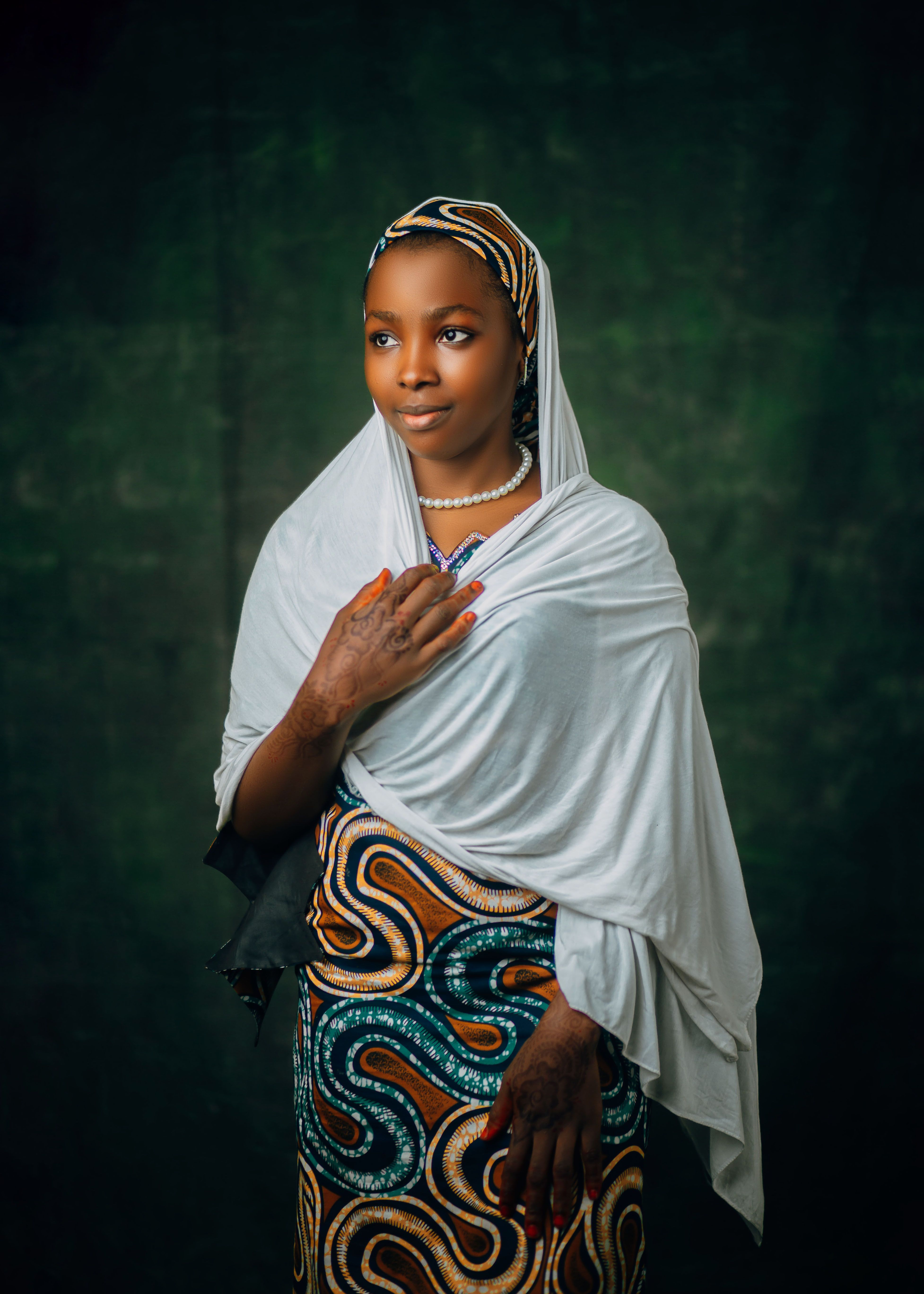 Portrait of African Woman in Vibrant Traditional Attire · Free Stock Photo