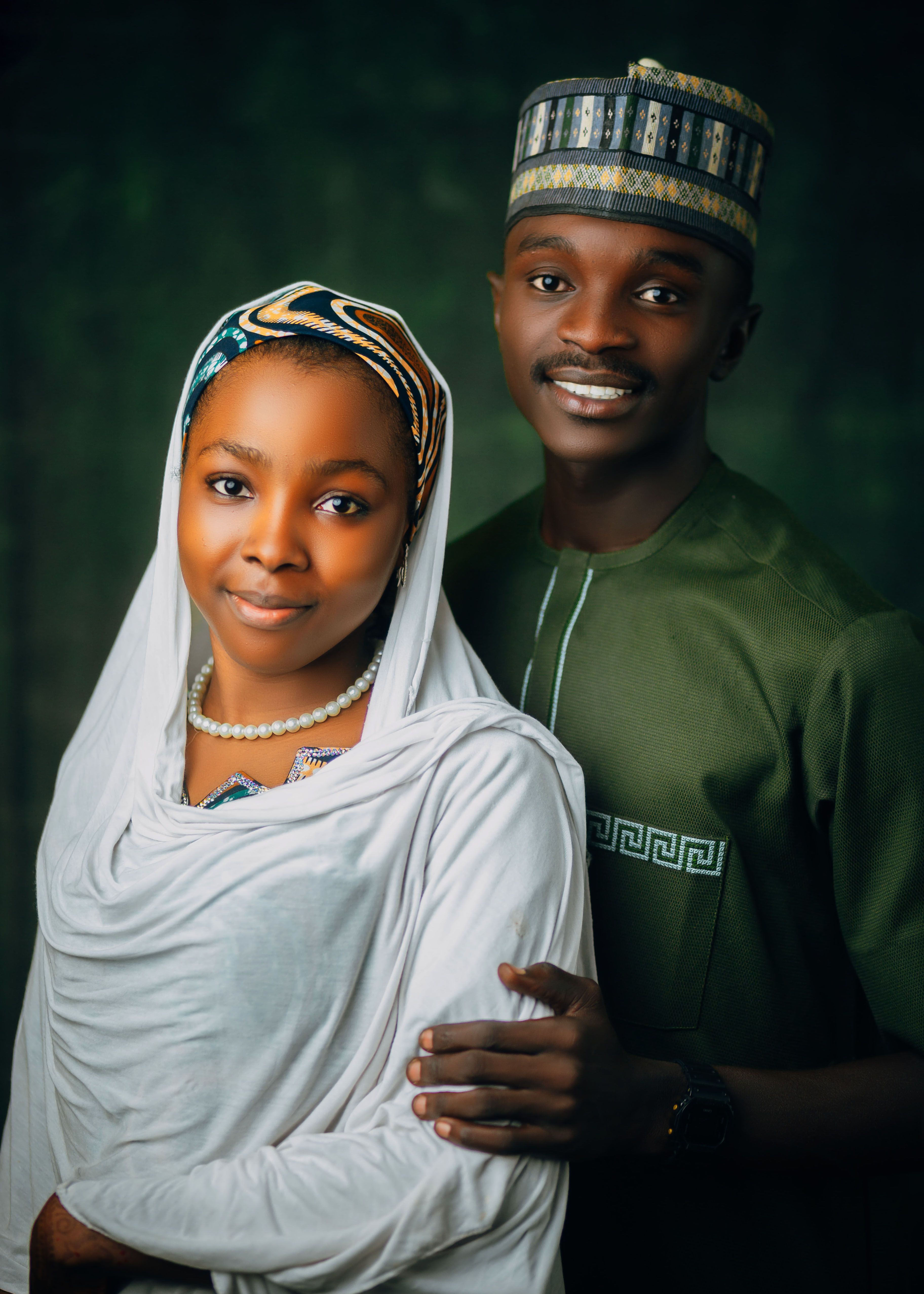 Cultural Portrait of Smiling Couple in Traditional Attire · Free Stock ...