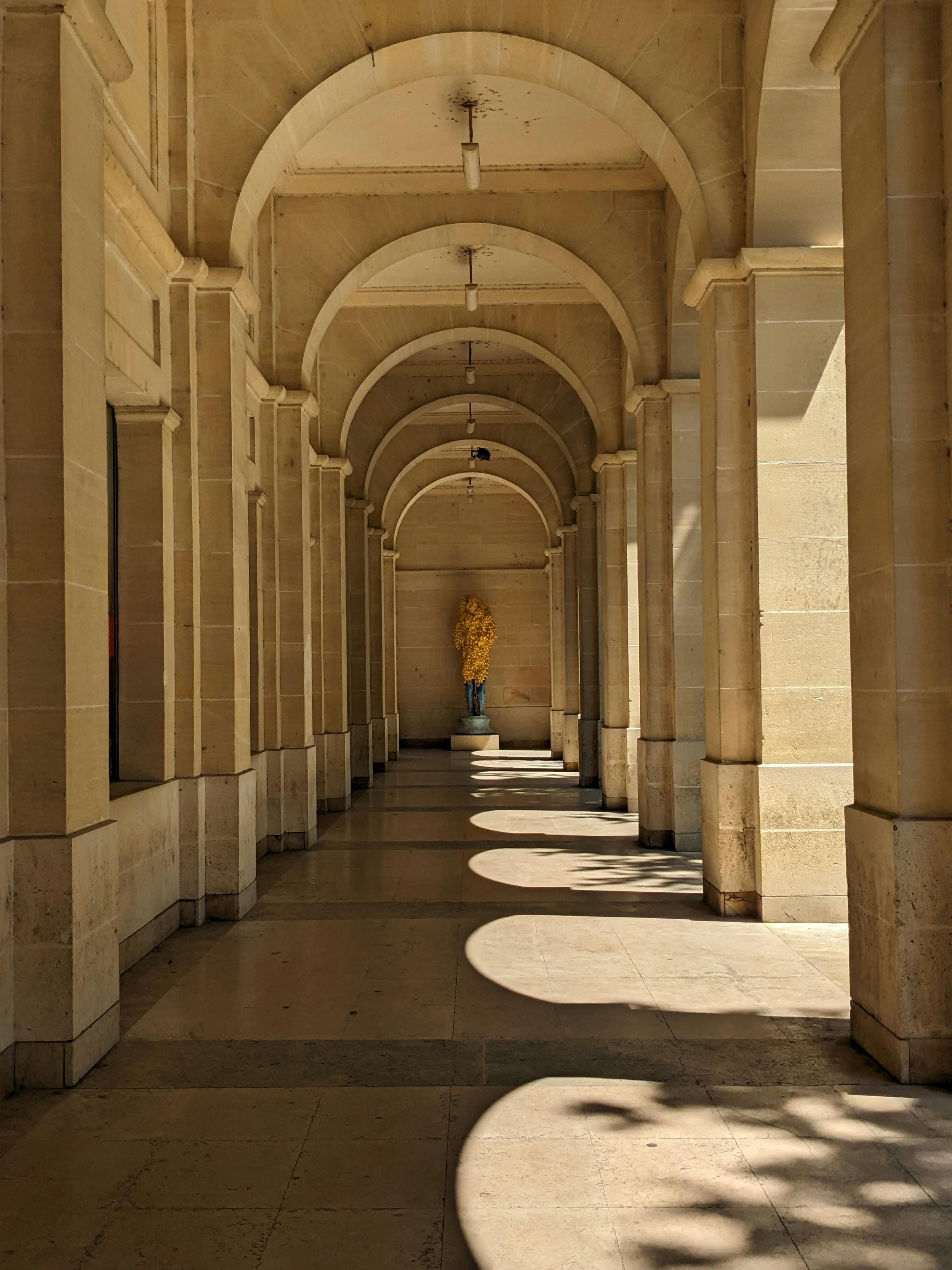Historic French Archway with Statue in Orléans · Free Stock Photo