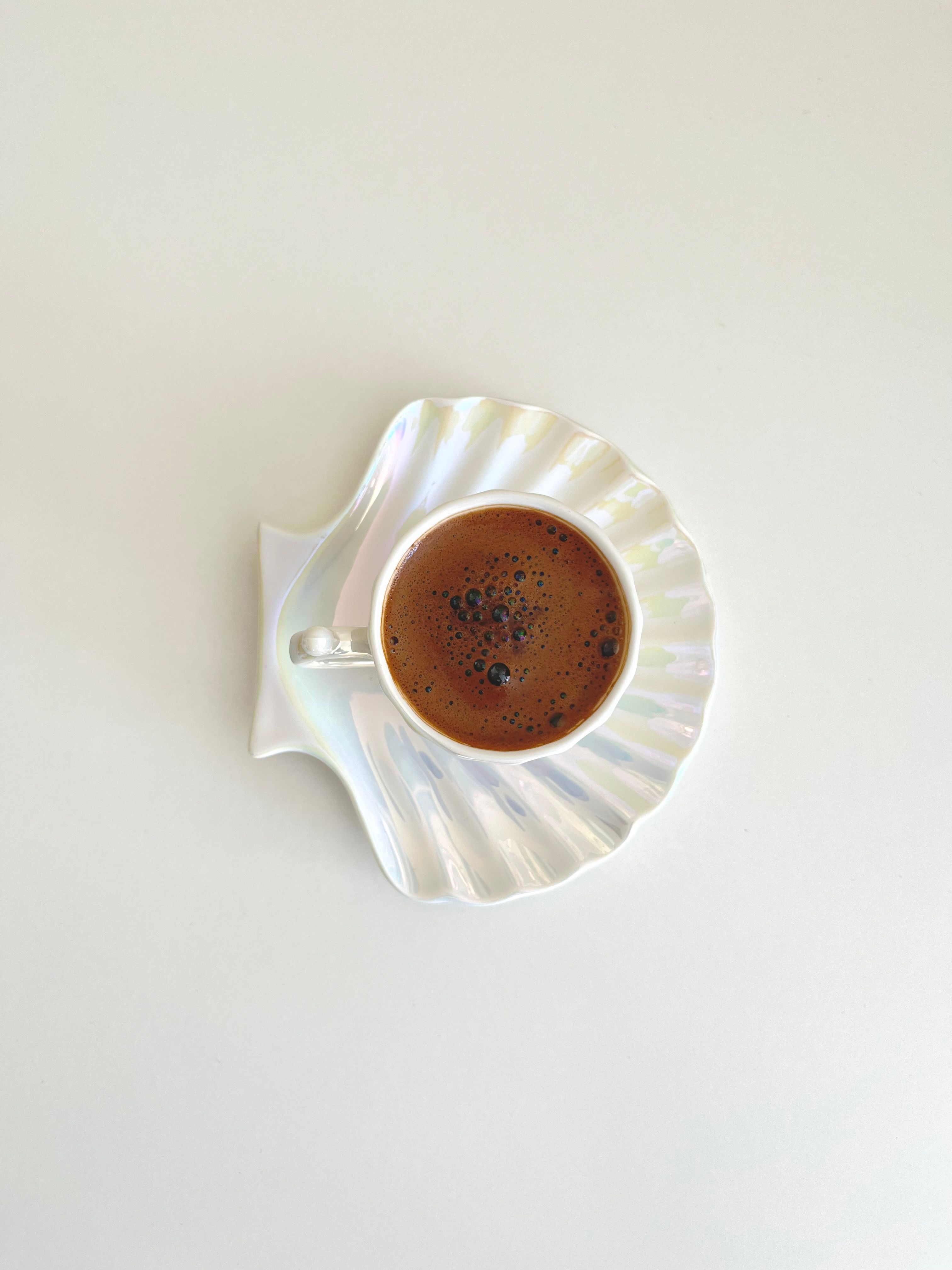 Elegant Turkish Coffee in Shell-Shaped Cup · Free Stock Photo