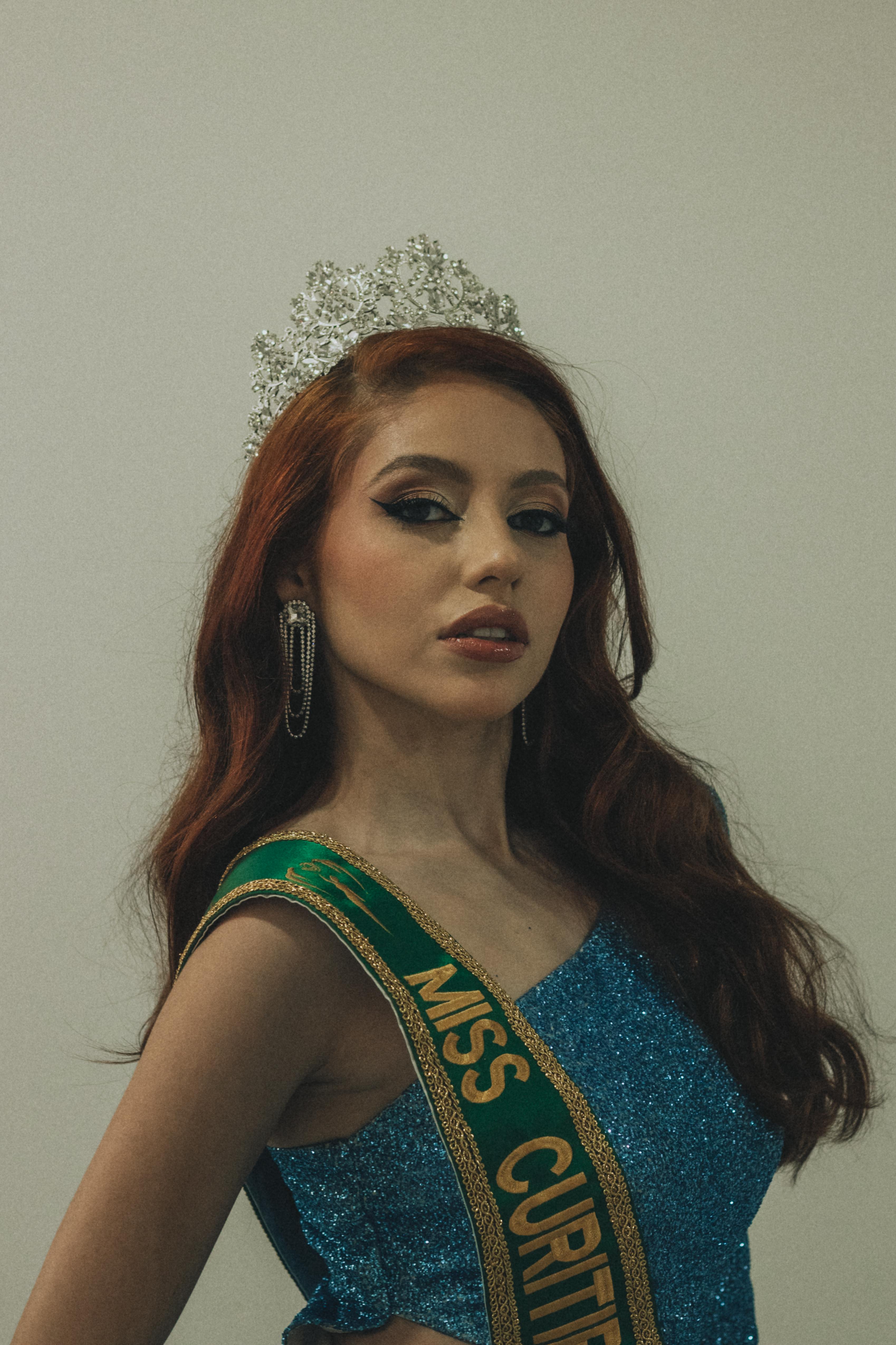 Elegant Miss Pageant Winner with Tiara and Sash · Free Stock Photo