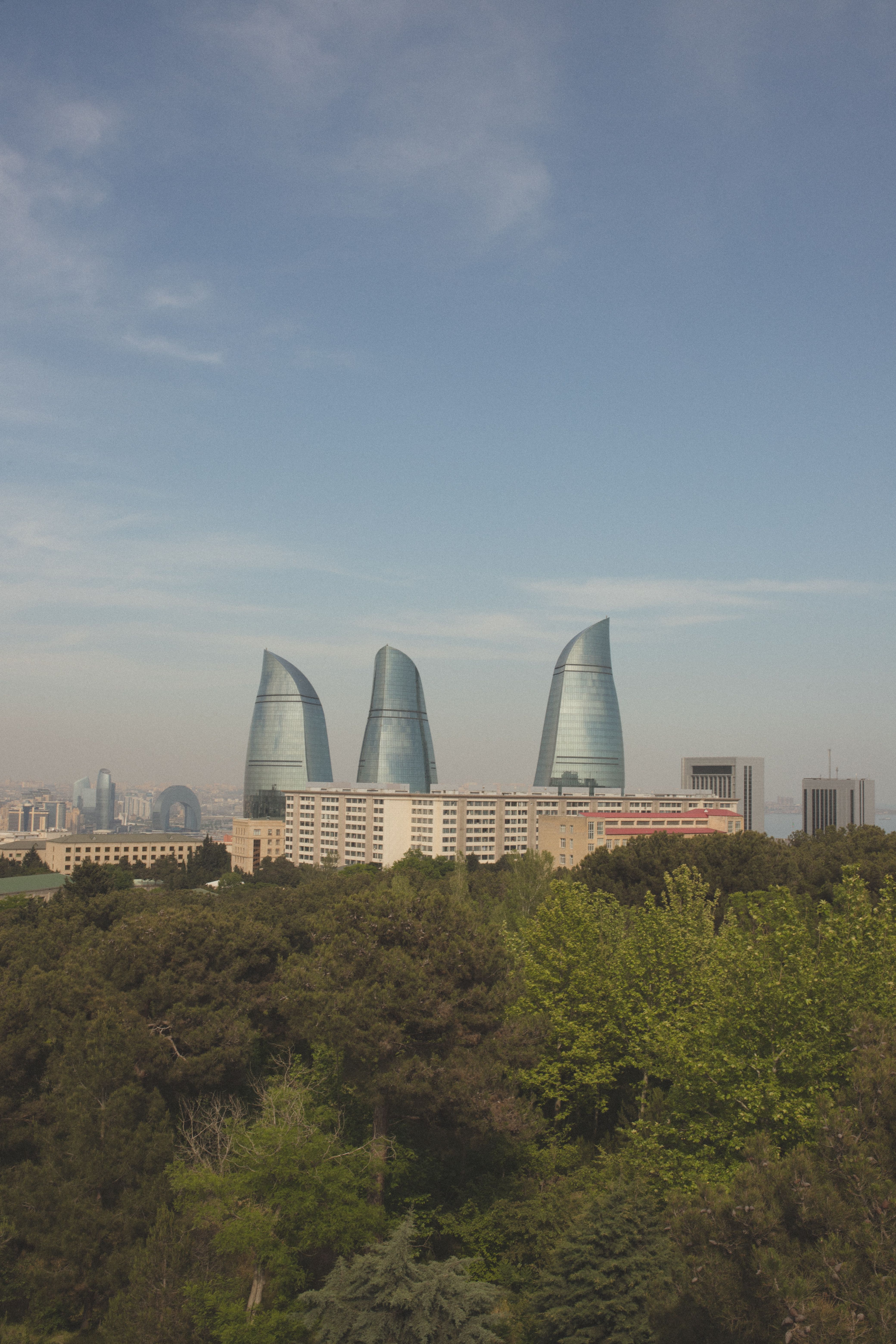 Iconic Flame Towers Rising Above Baku Skyline · Free Stock Photo