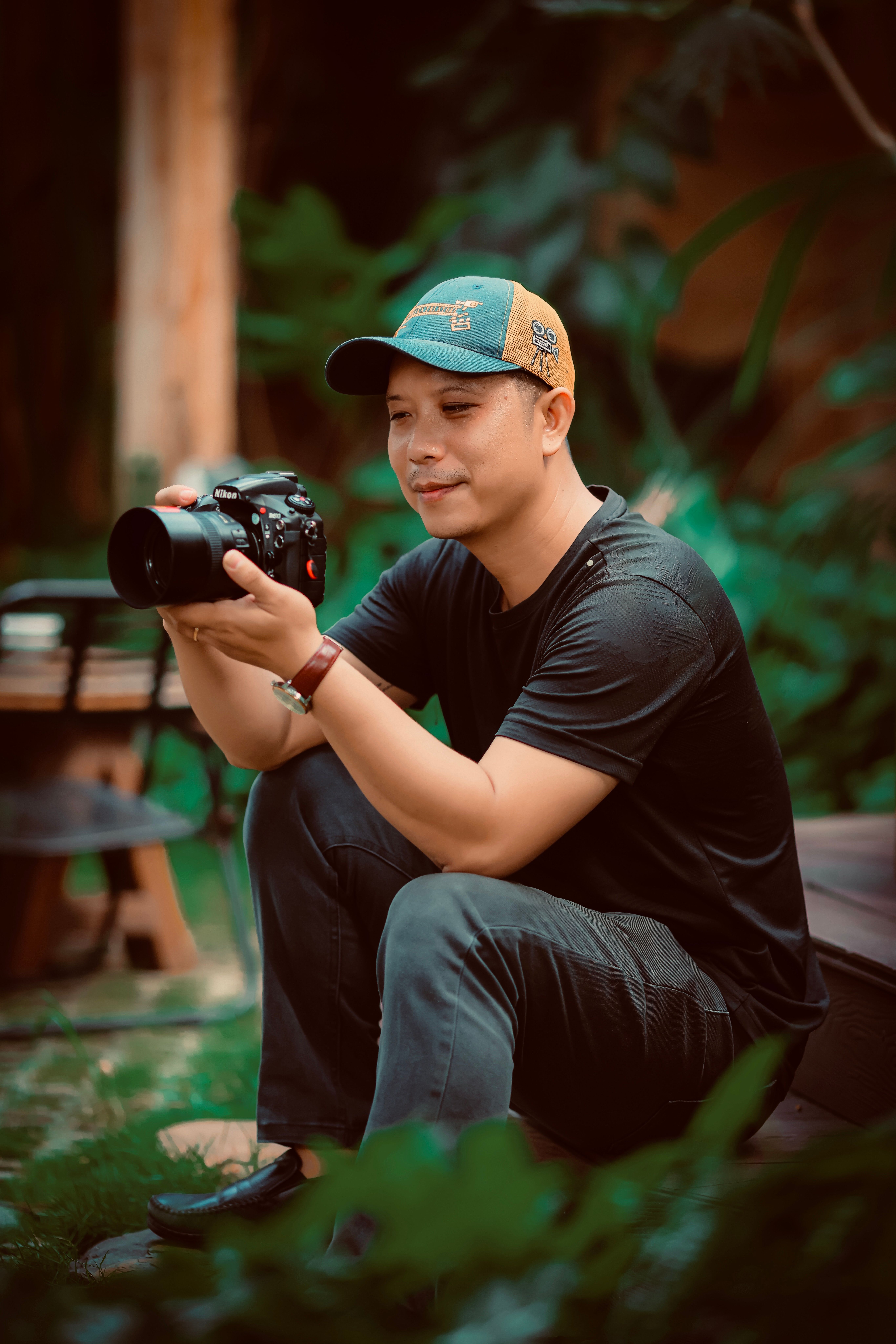 Male Photographer Enjoying Outdoor Capture Session · Free Stock Photo