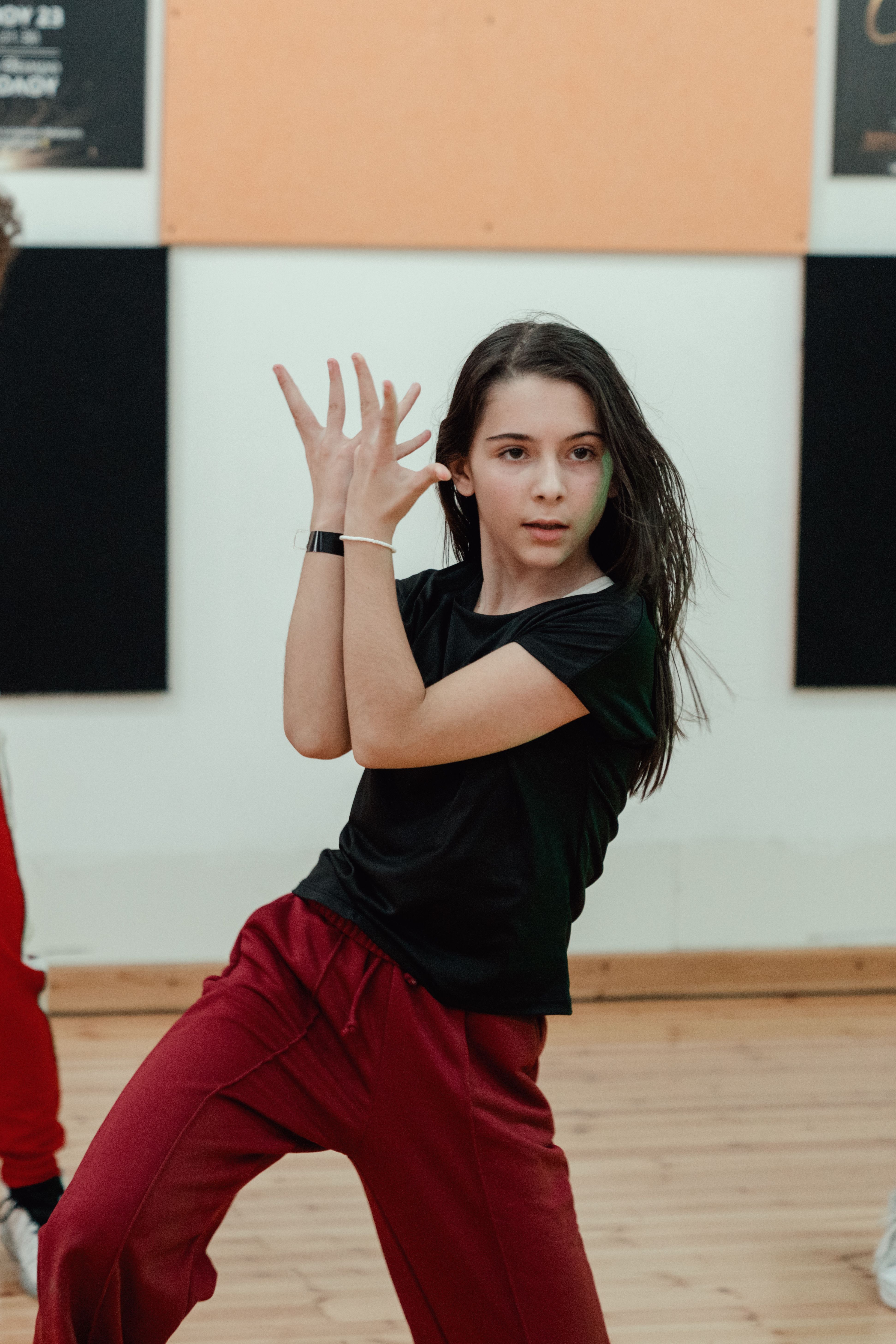 Dynamic Teen Dance Performance in Studio · Free Stock Photo