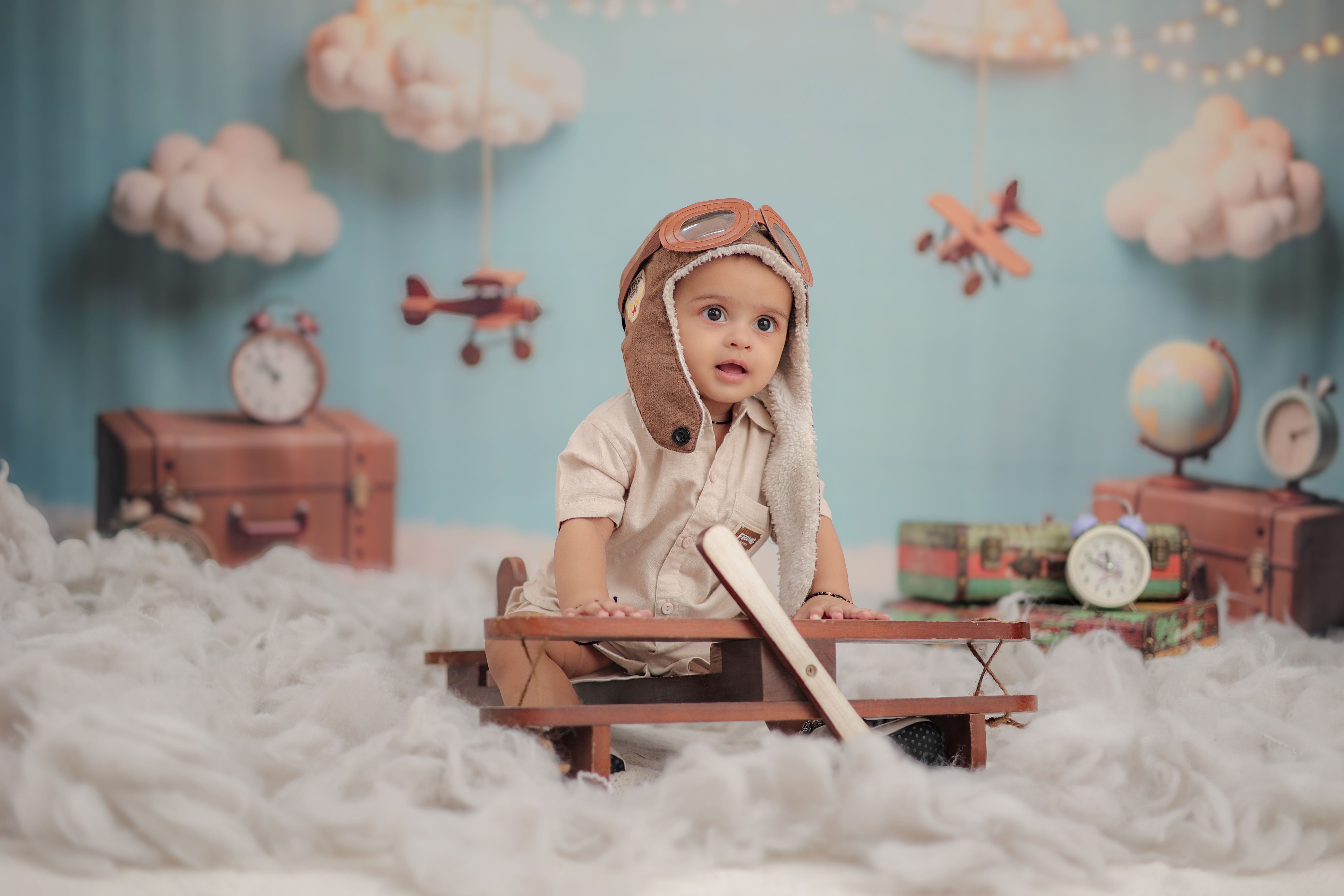 Adorable Baby in Aviator Themed Setting · Free Stock Photo