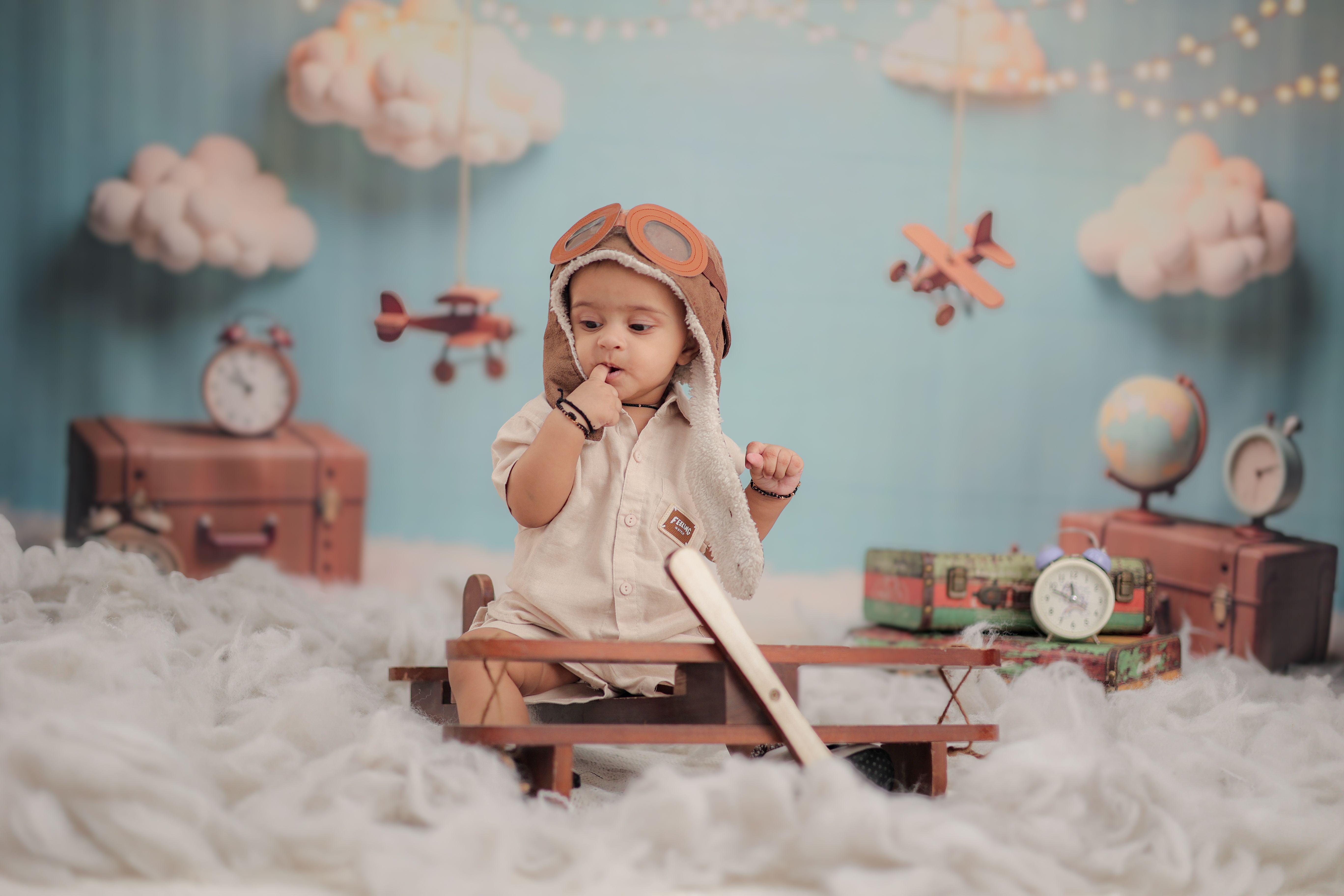 Adorable Baby Pilot in Vintage Aviation Setting · Free Stock Photo