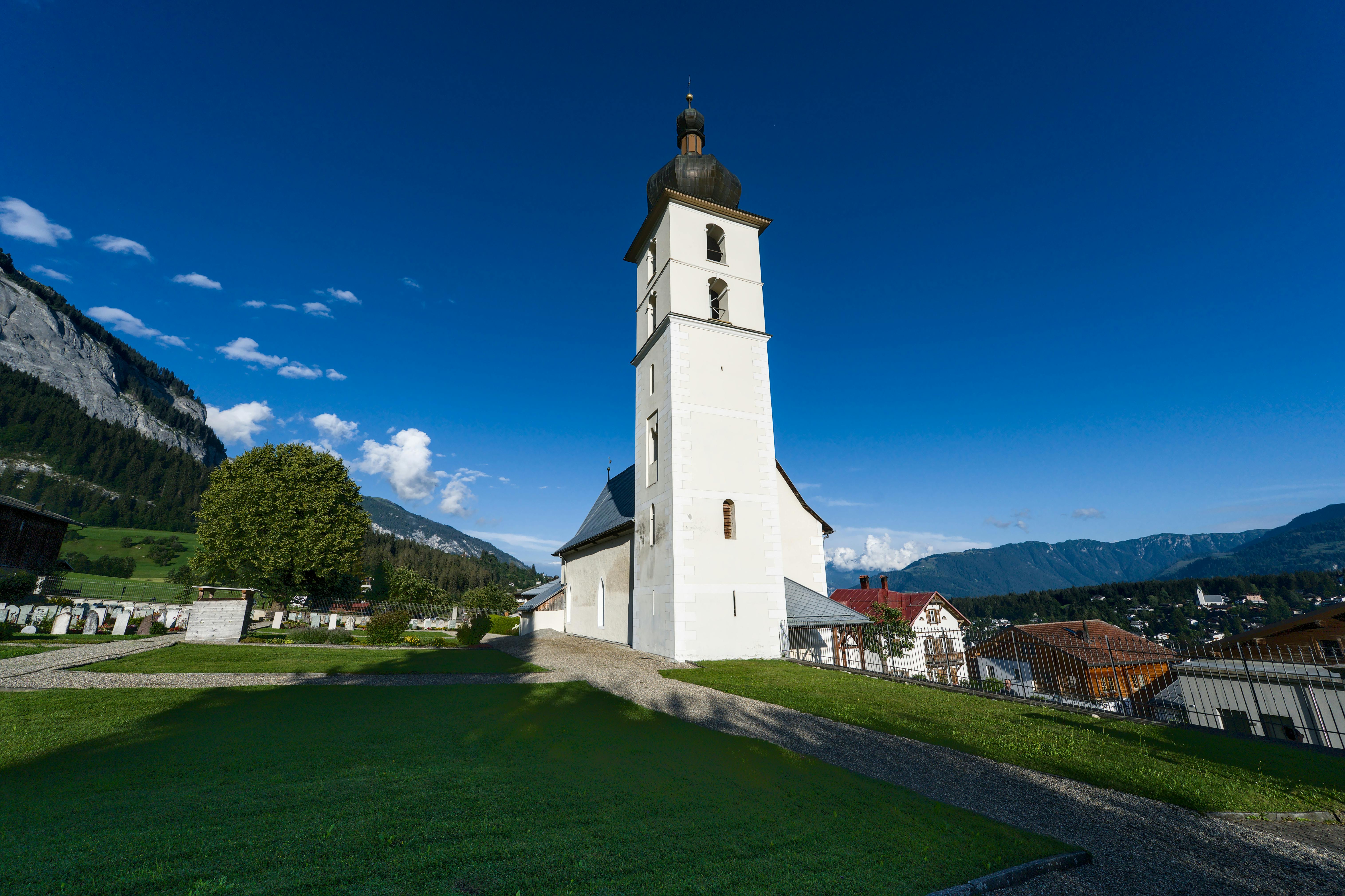 Scenic Church in Flims with Alpine Background · Free Stock Photo