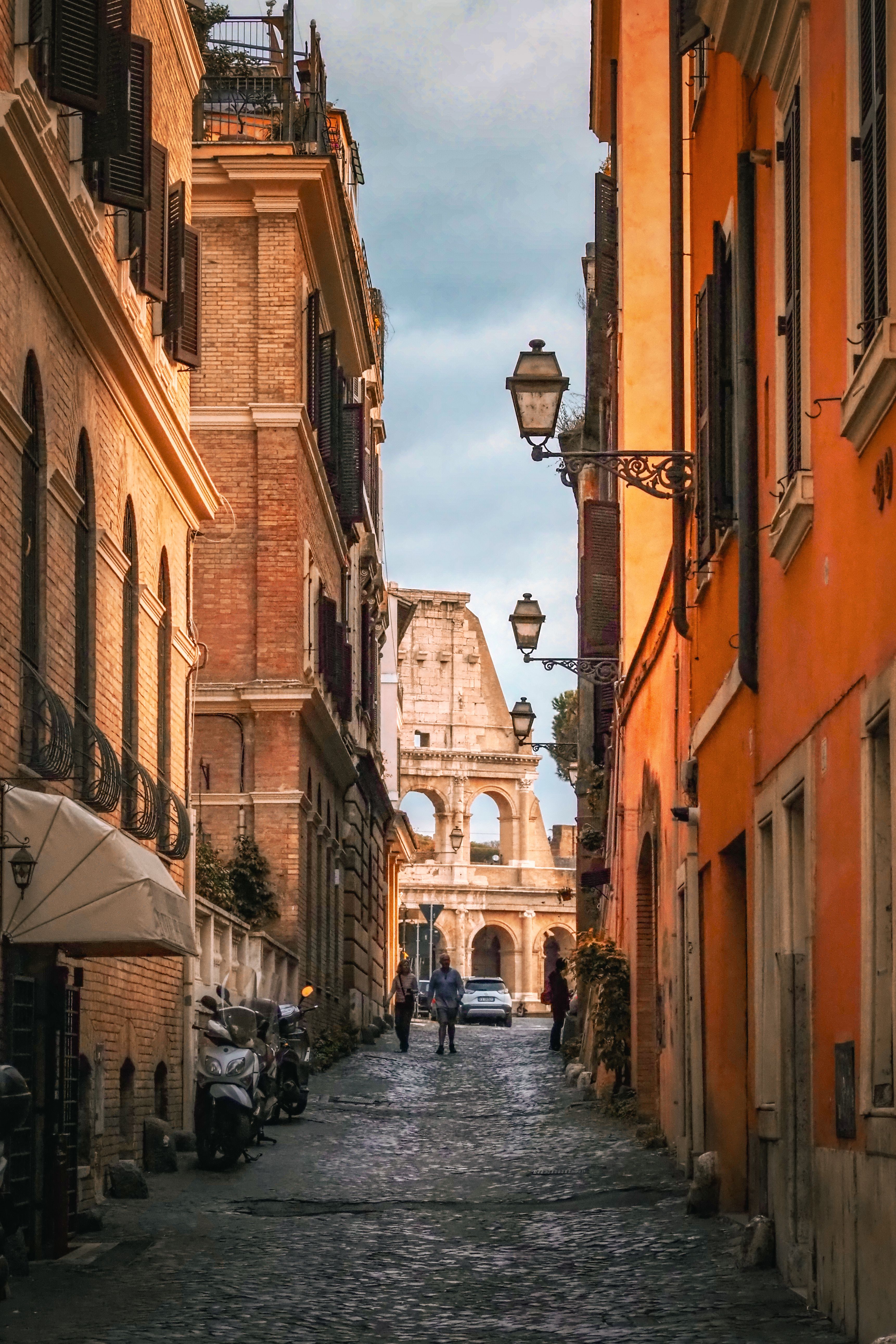 Charming Roman Street with Colosseum View · Free Stock Photo