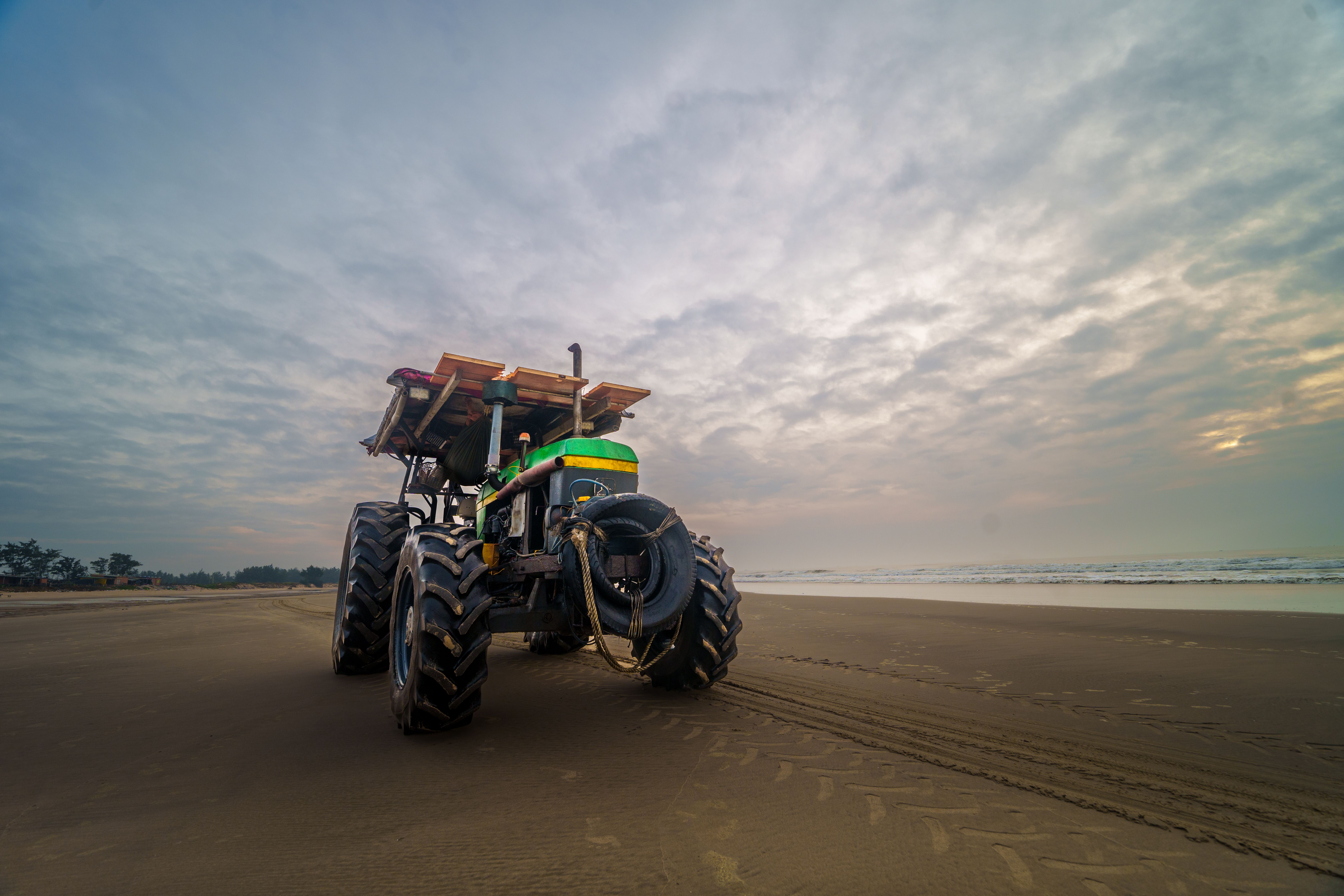 Tractor on Phước Hải Beach at Sunrise · Free Stock Photo