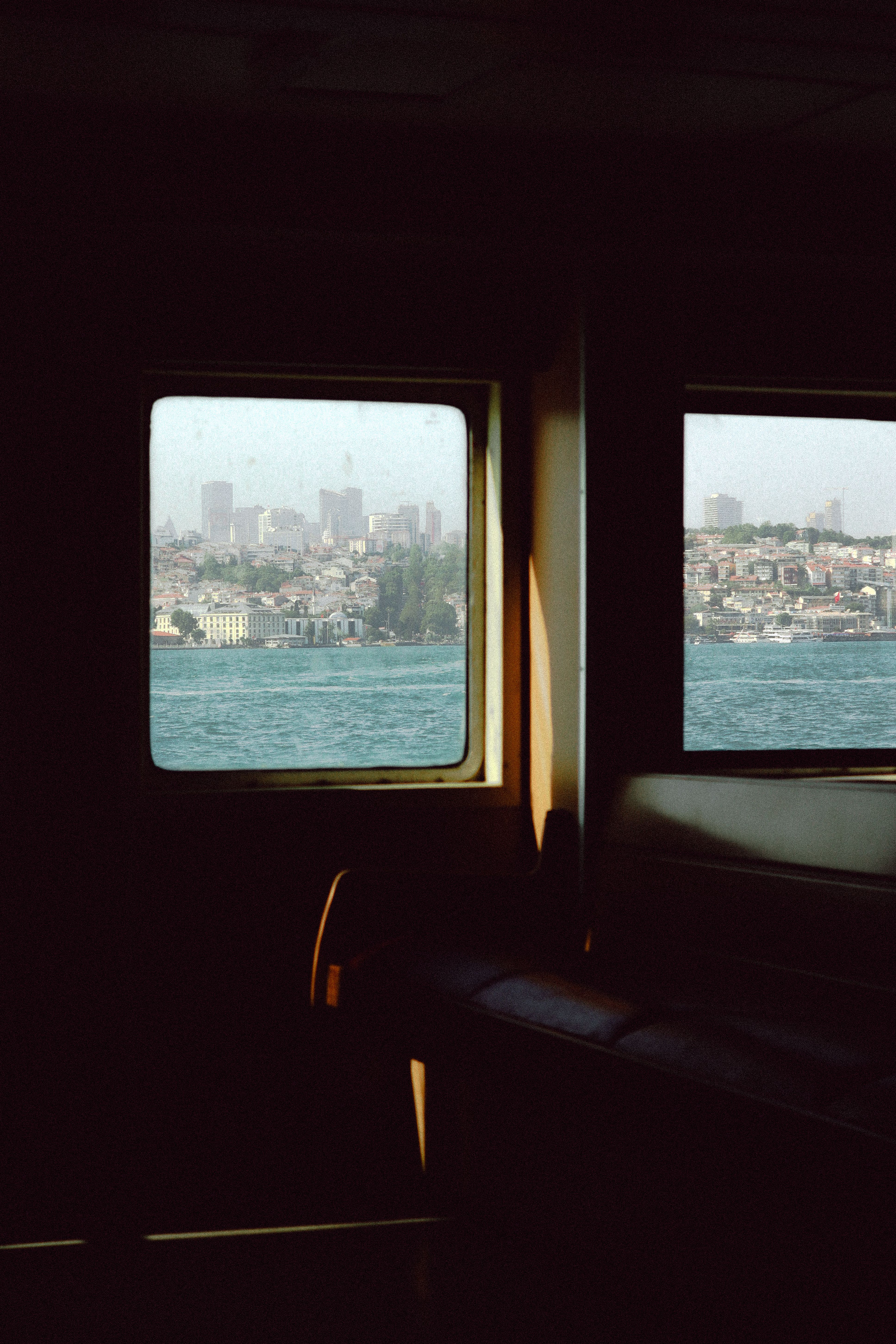 View of Cityscape Through Ferry Window in Istanbul · Free Stock Photo