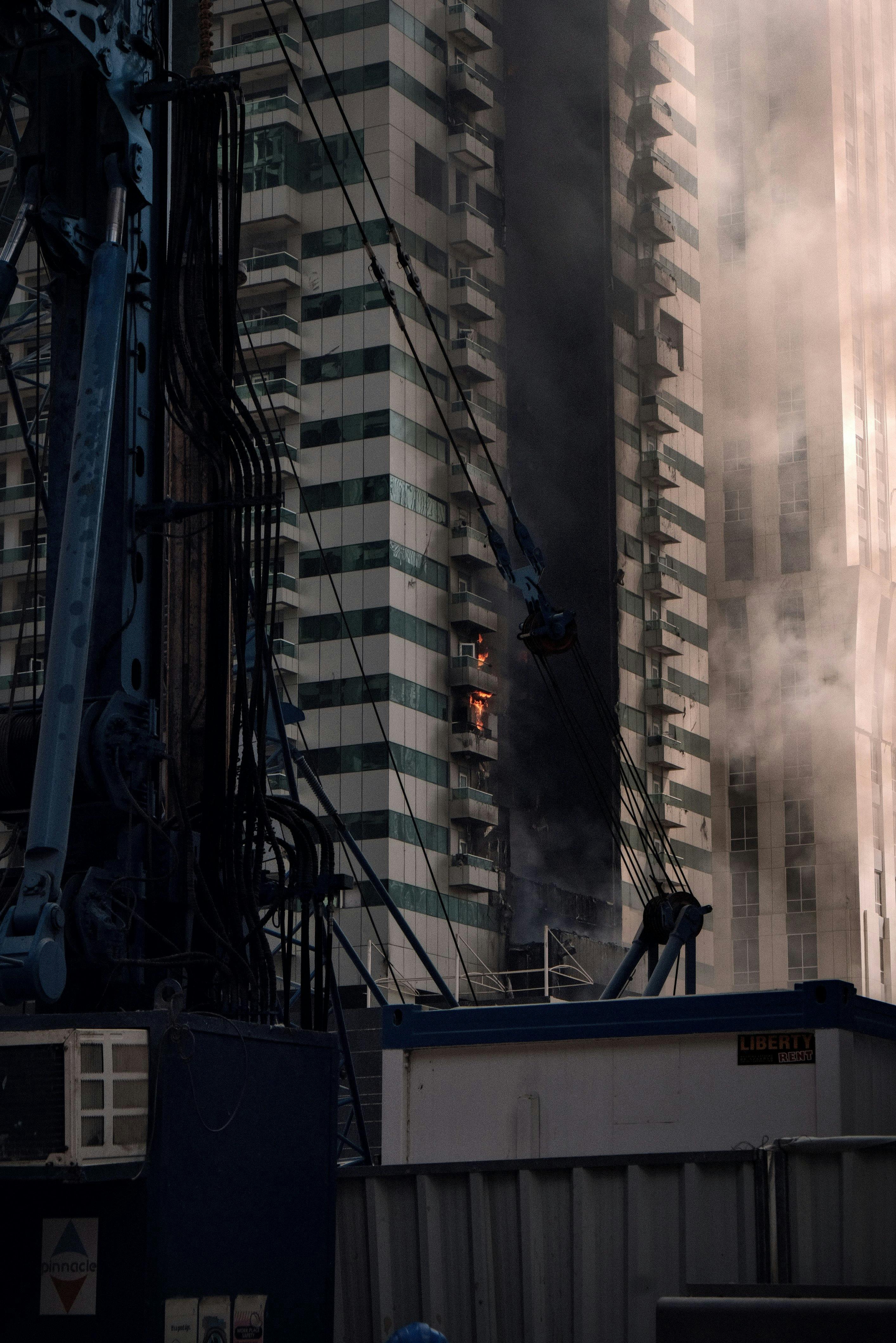 Skyscraper Fire in Dubai Marina: Aerial Perspective · Free Stock Photo