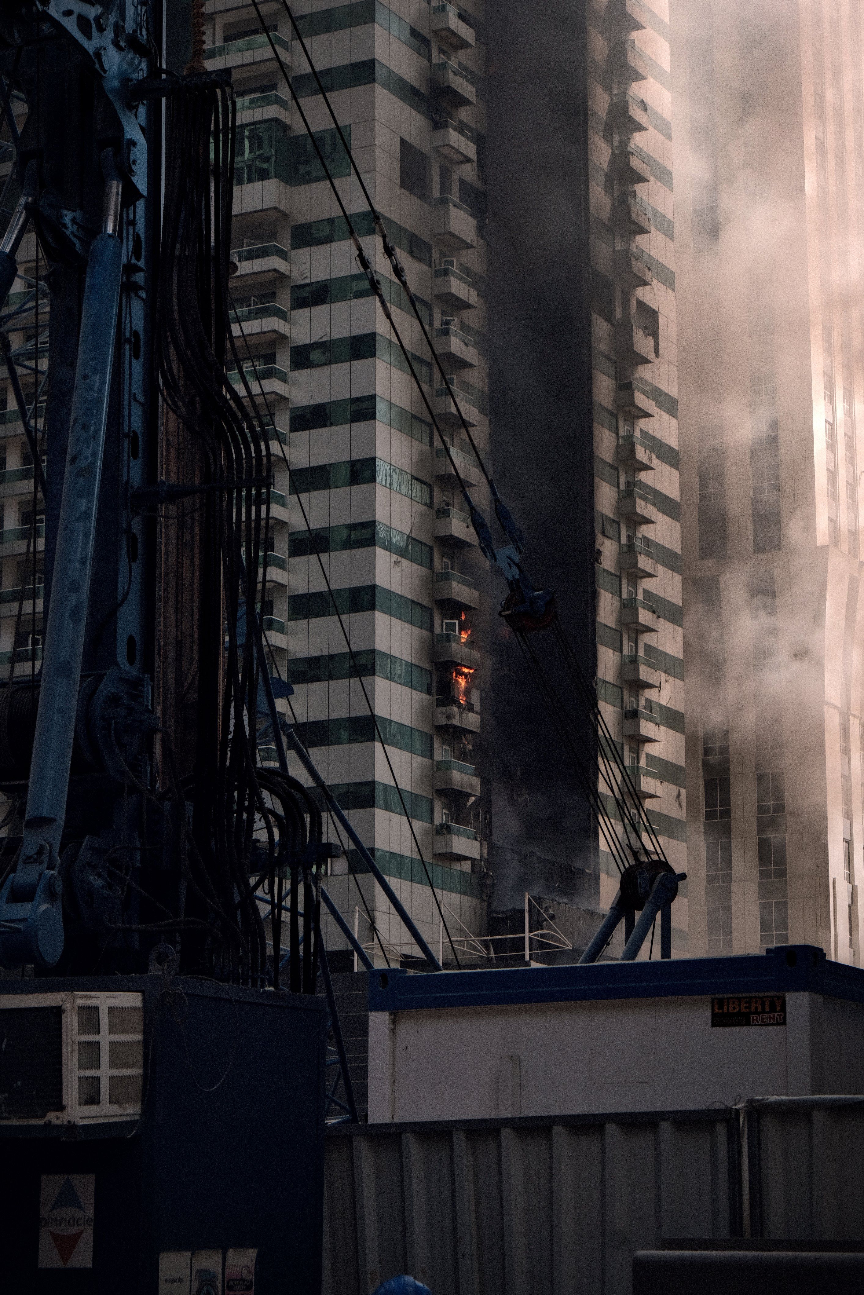 Skyscraper Fire in Dubai Marina: Aerial Perspective · Free Stock Photo
