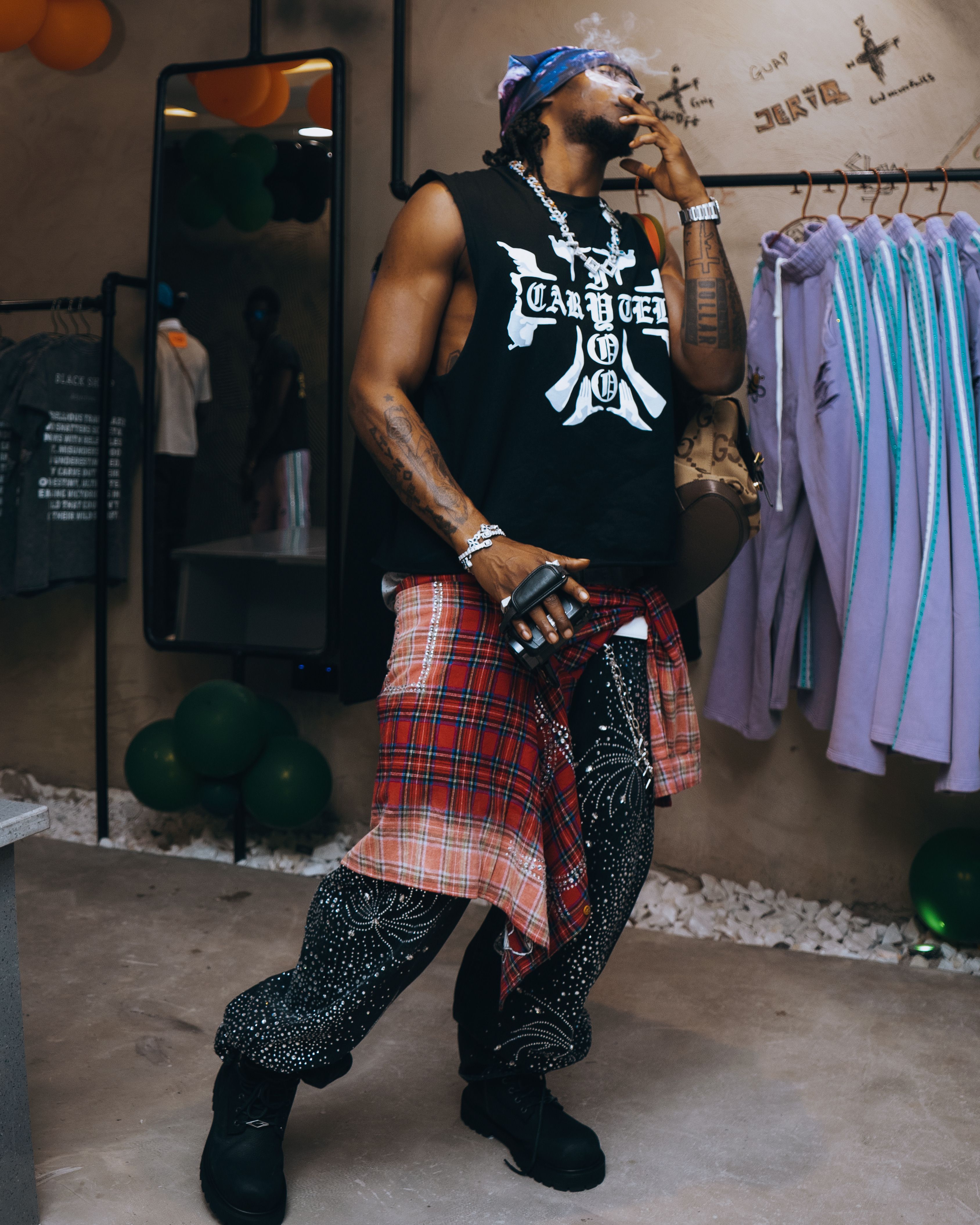 Stylish Person in Trendy Urban Fashion Boutique · Free Stock Photo