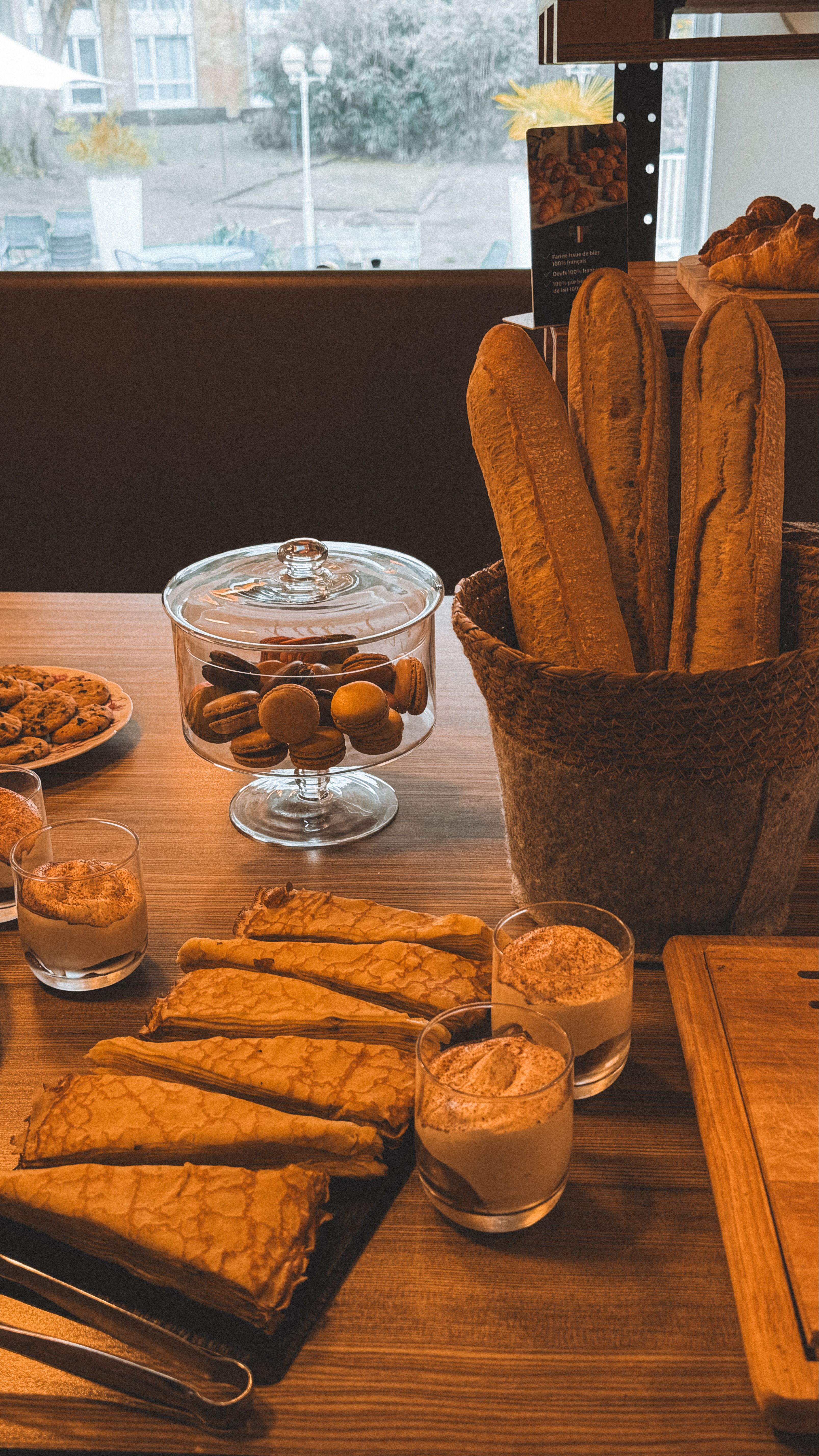 Cozy Indoor Bakery Setting with Assorted Pastries · Free Stock Photo