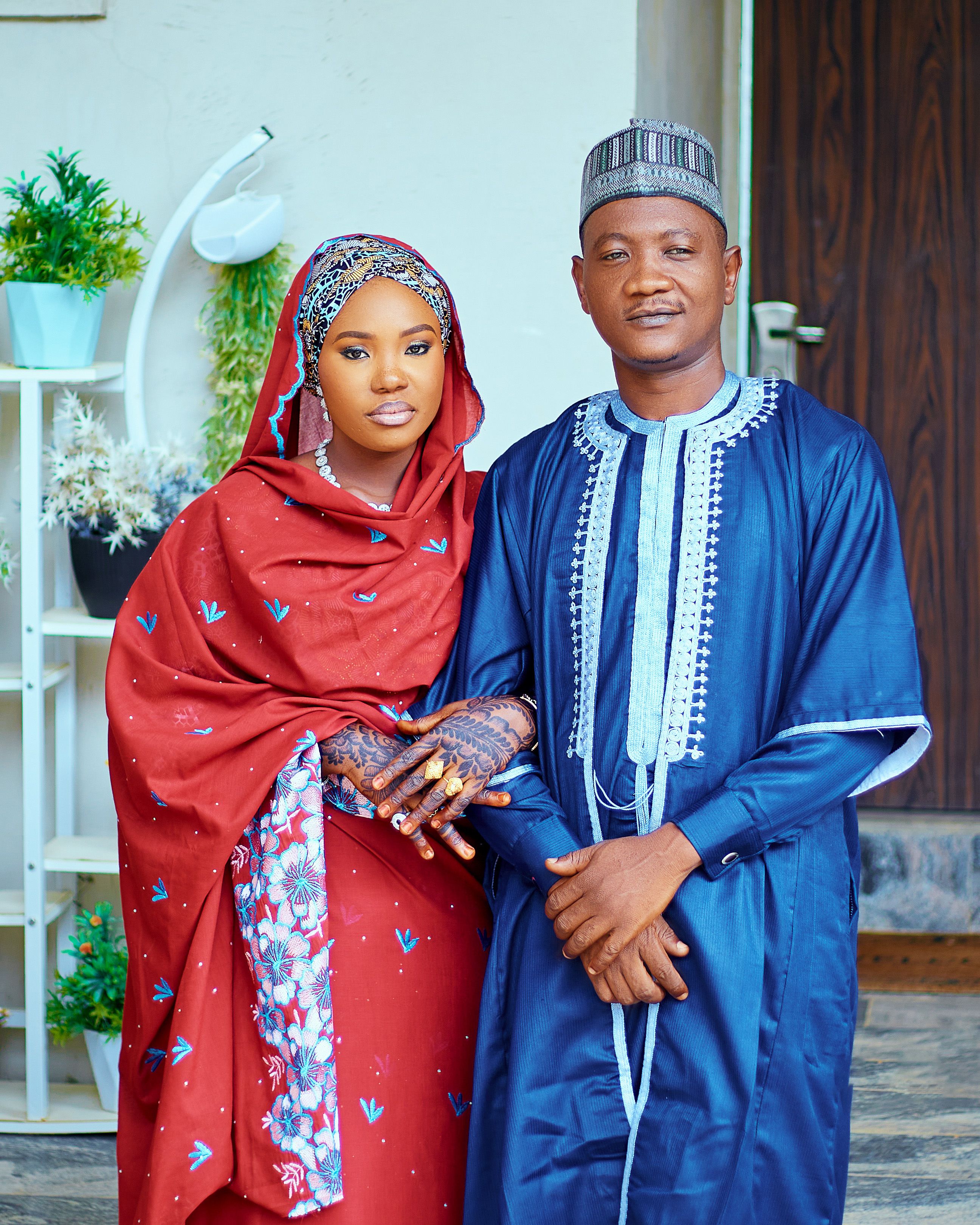 Cultural Portrait of a Couple in Traditional Attire · Free Stock Photo