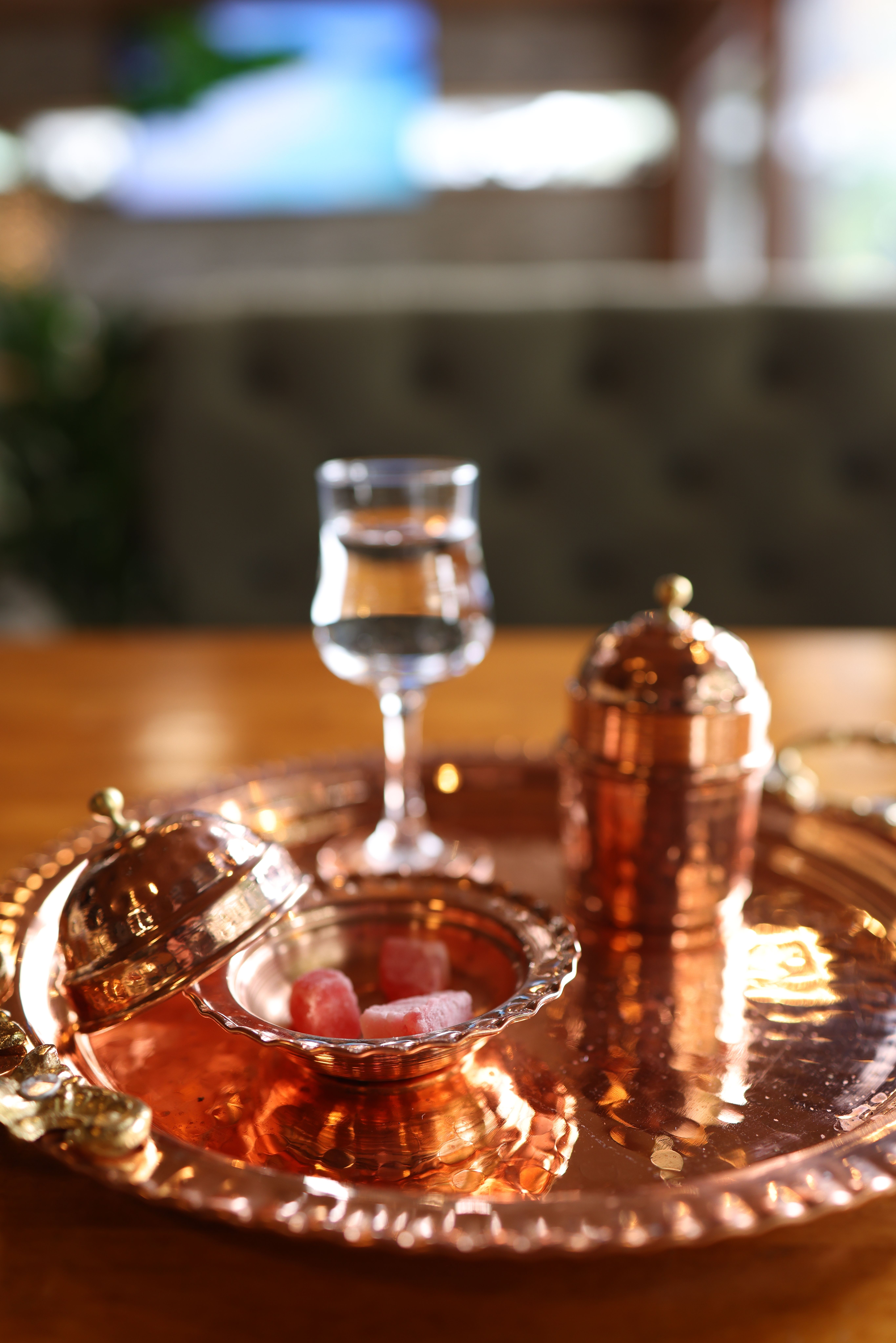 Elegant Copper Tea Set with Glass of Water · Free Stock Photo