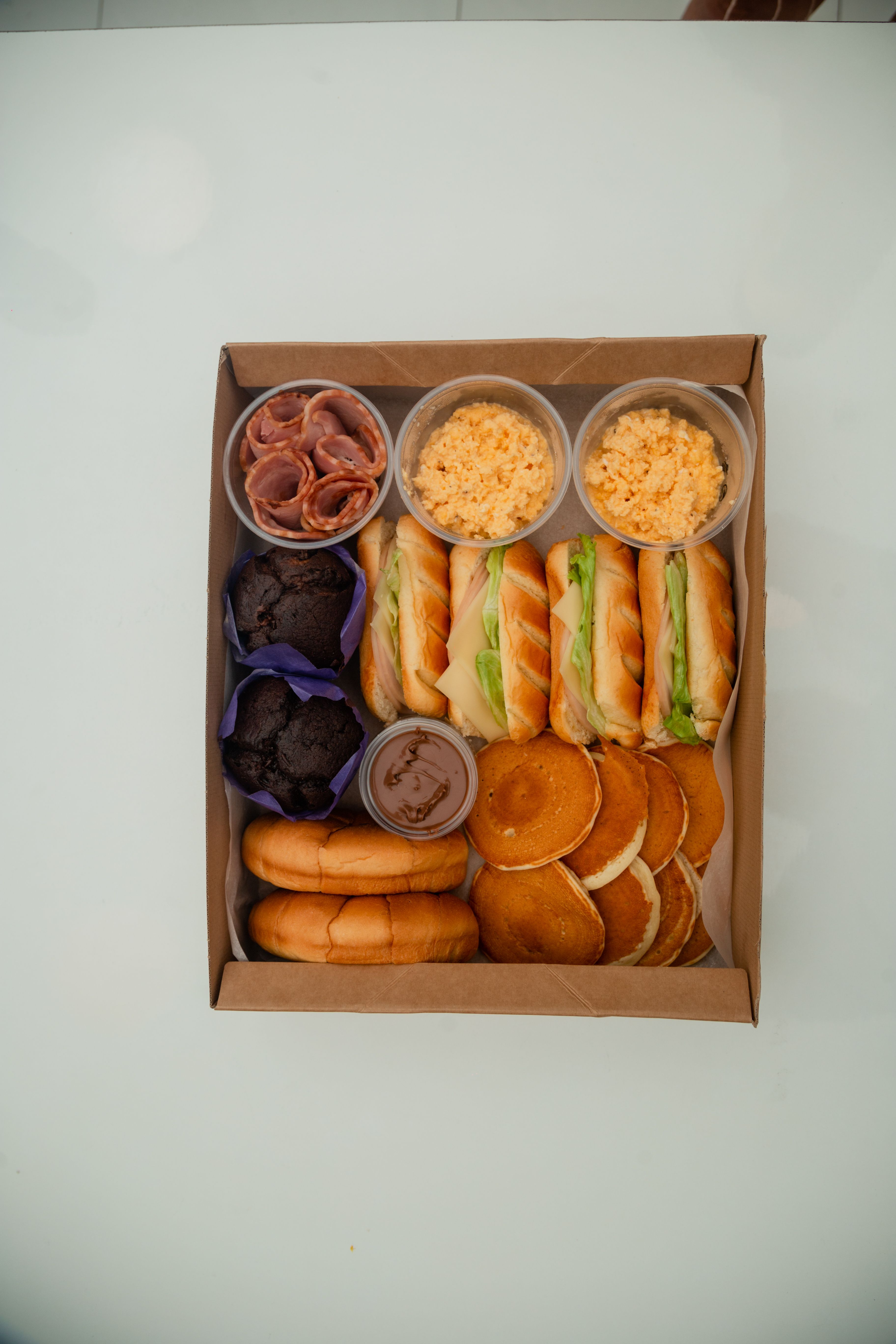 Delicious Breakfast Box with Assorted Pastries · Free Stock Photo