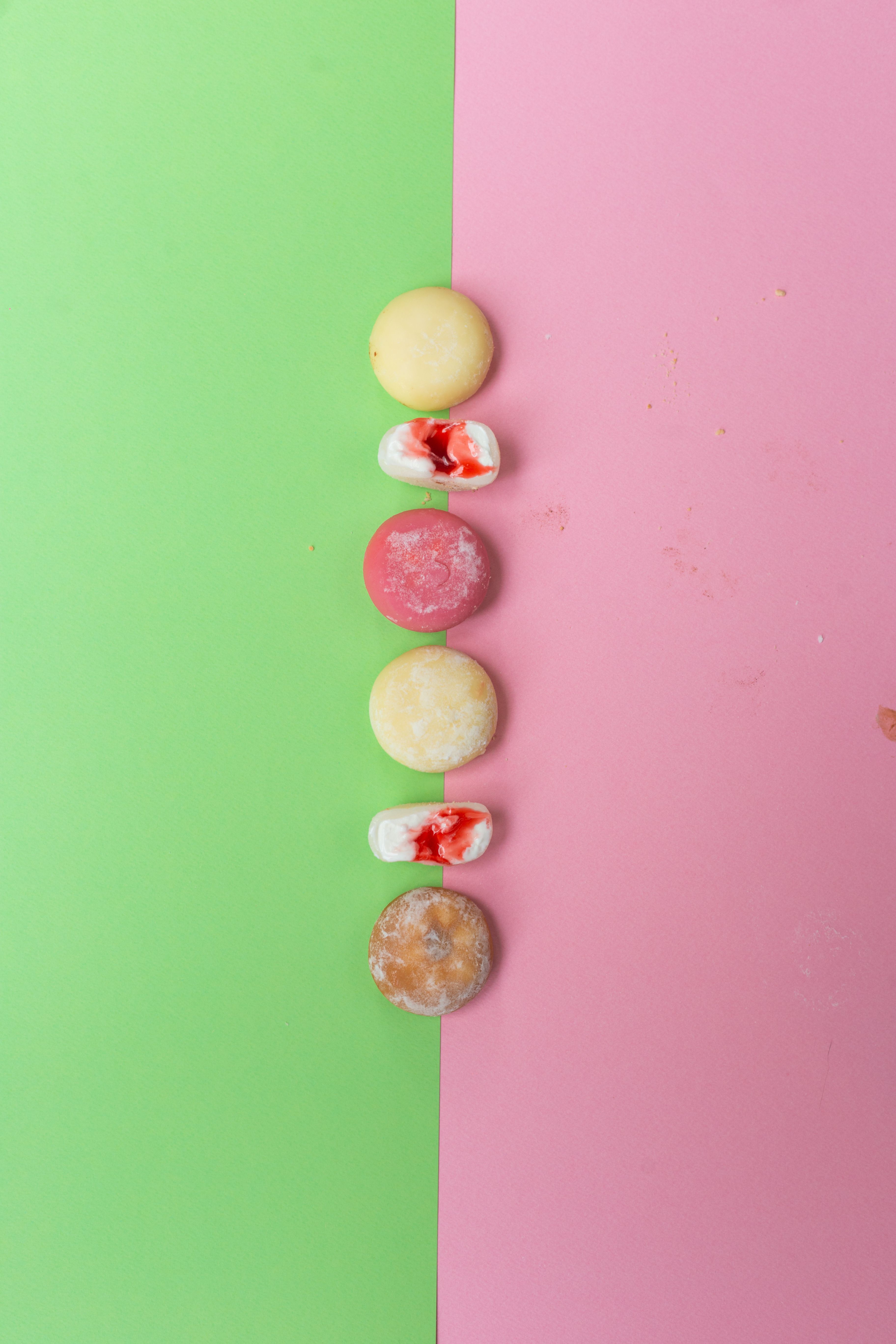 Colorful Candy Arrangement on Pastel Background · Free Stock Photo