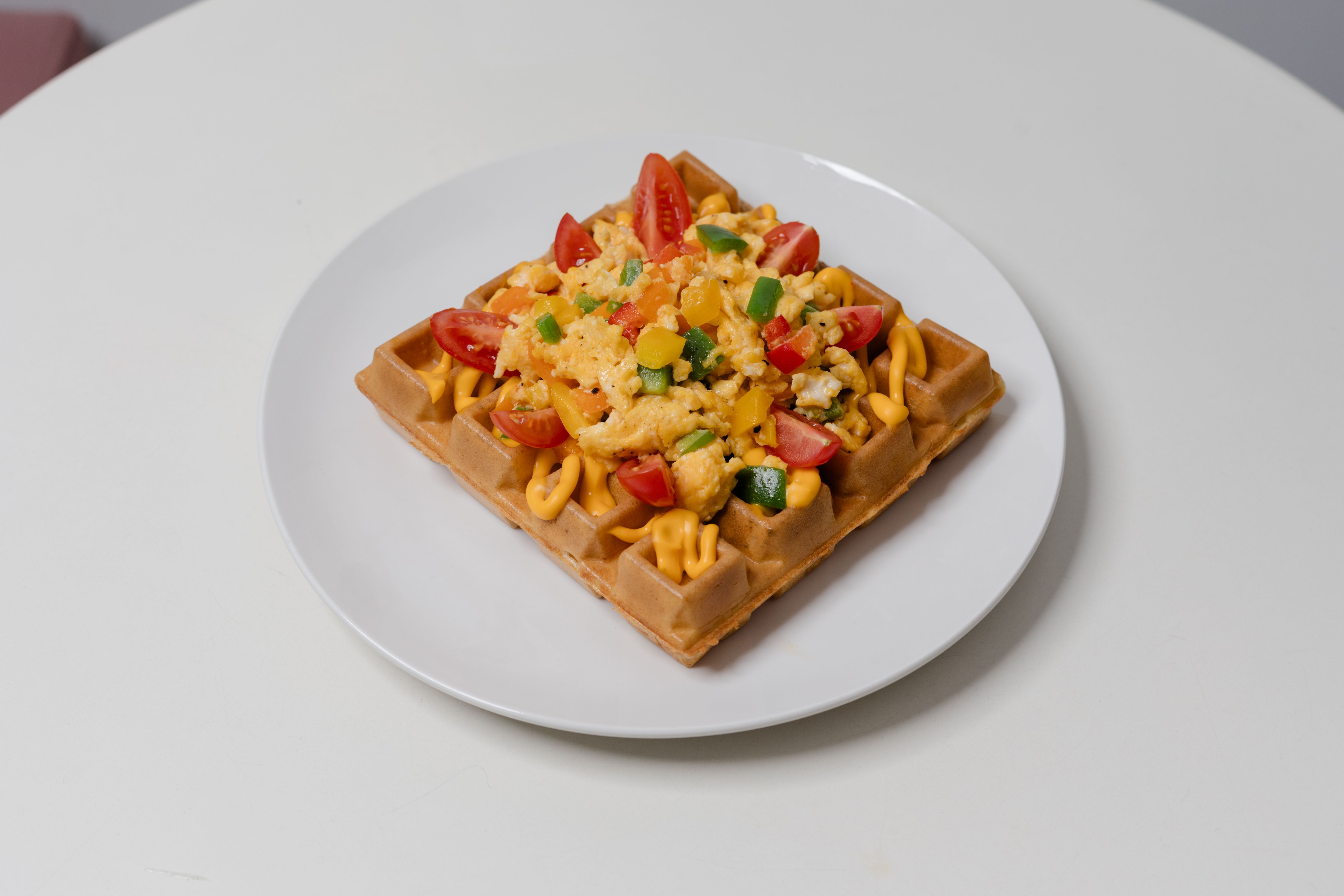 Savory Waffle with Scrambled Eggs and Fresh Vegetables · Free Stock Photo