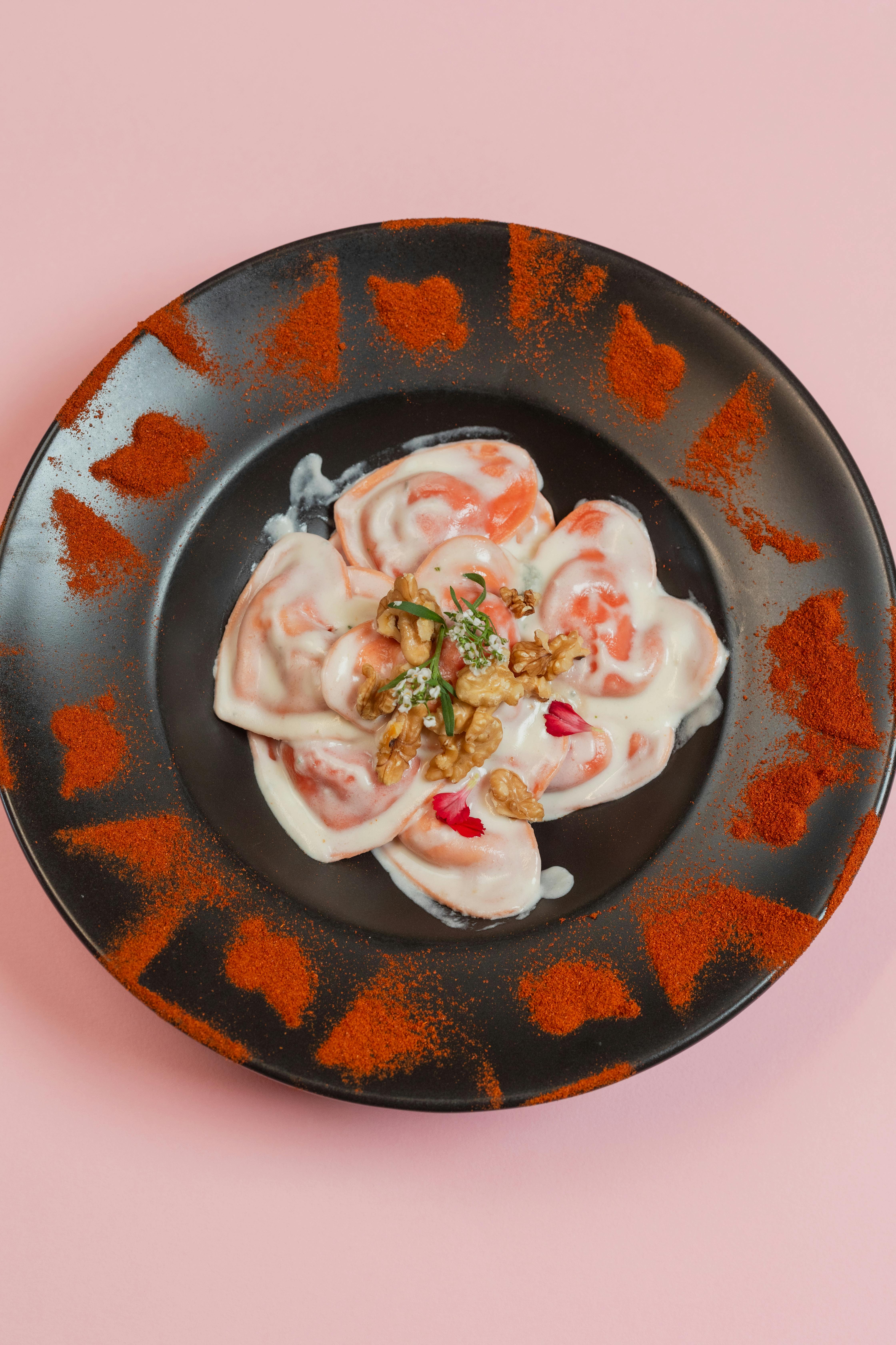 Gourmet Beet Ravioli with Creamy Sauce · Free Stock Photo