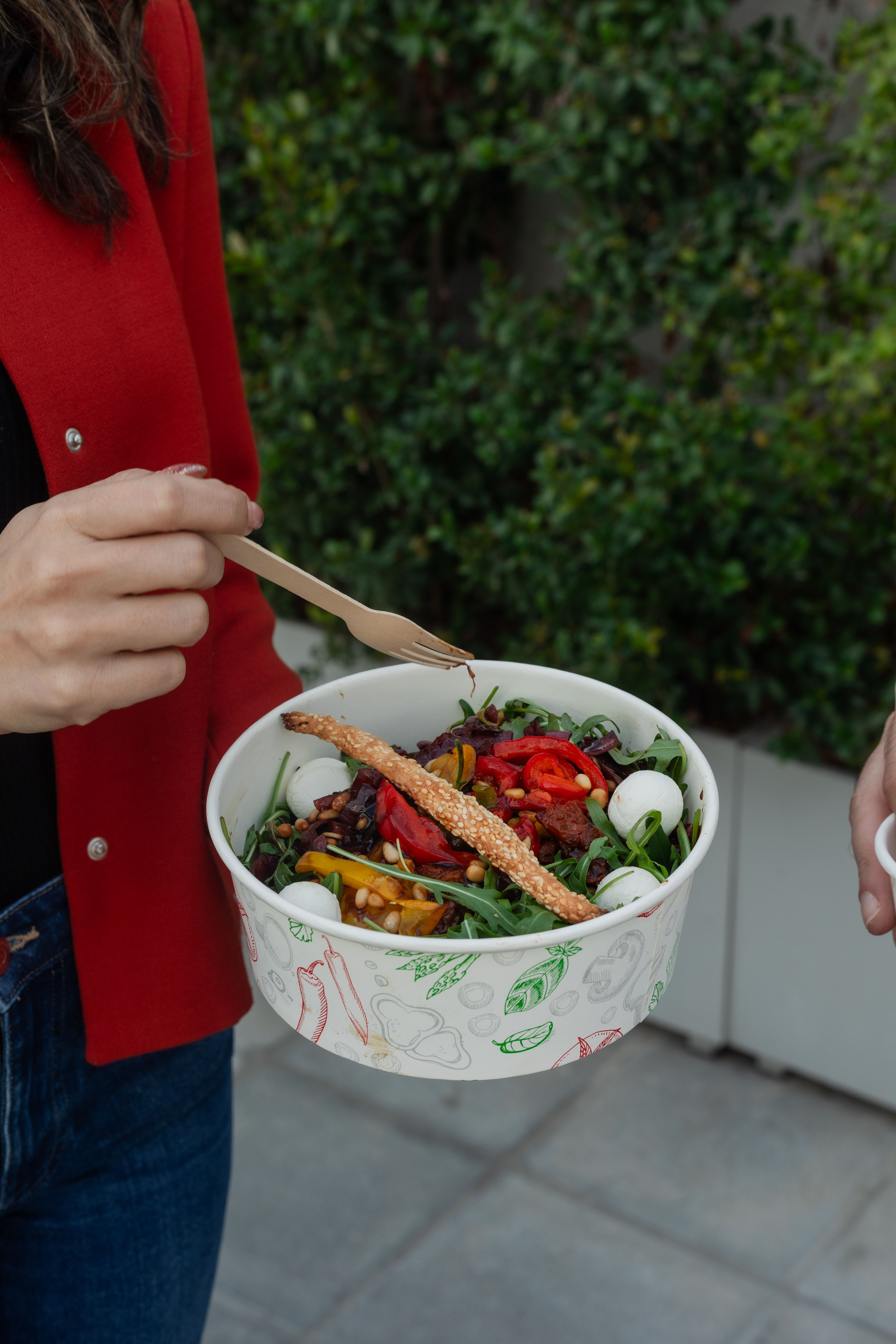 Healthy Outdoor Salad Enjoyment with Friends · Free Stock Photo