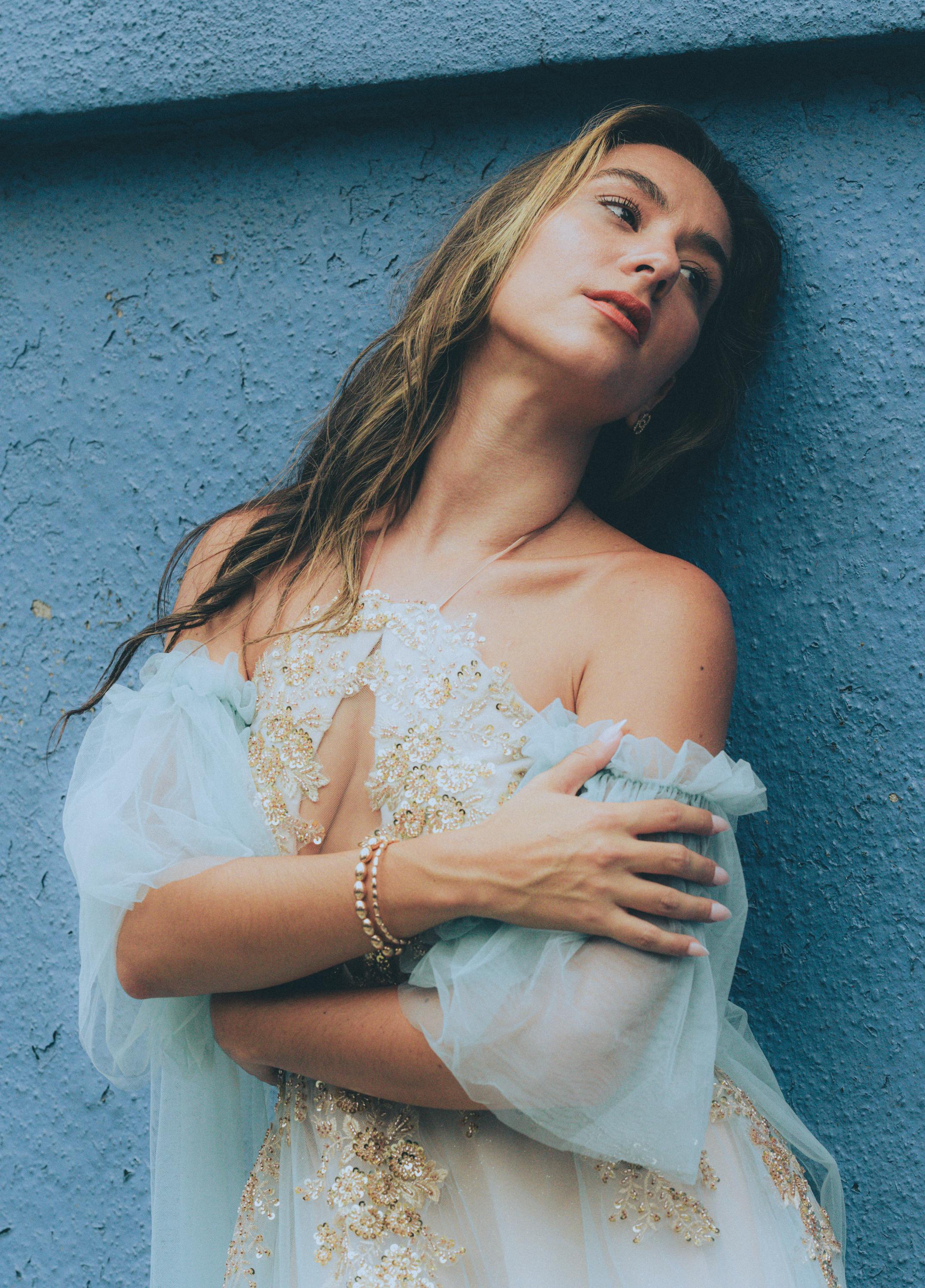 Elegant Portrait of a Woman in Stylish Attire · Free Stock Photo