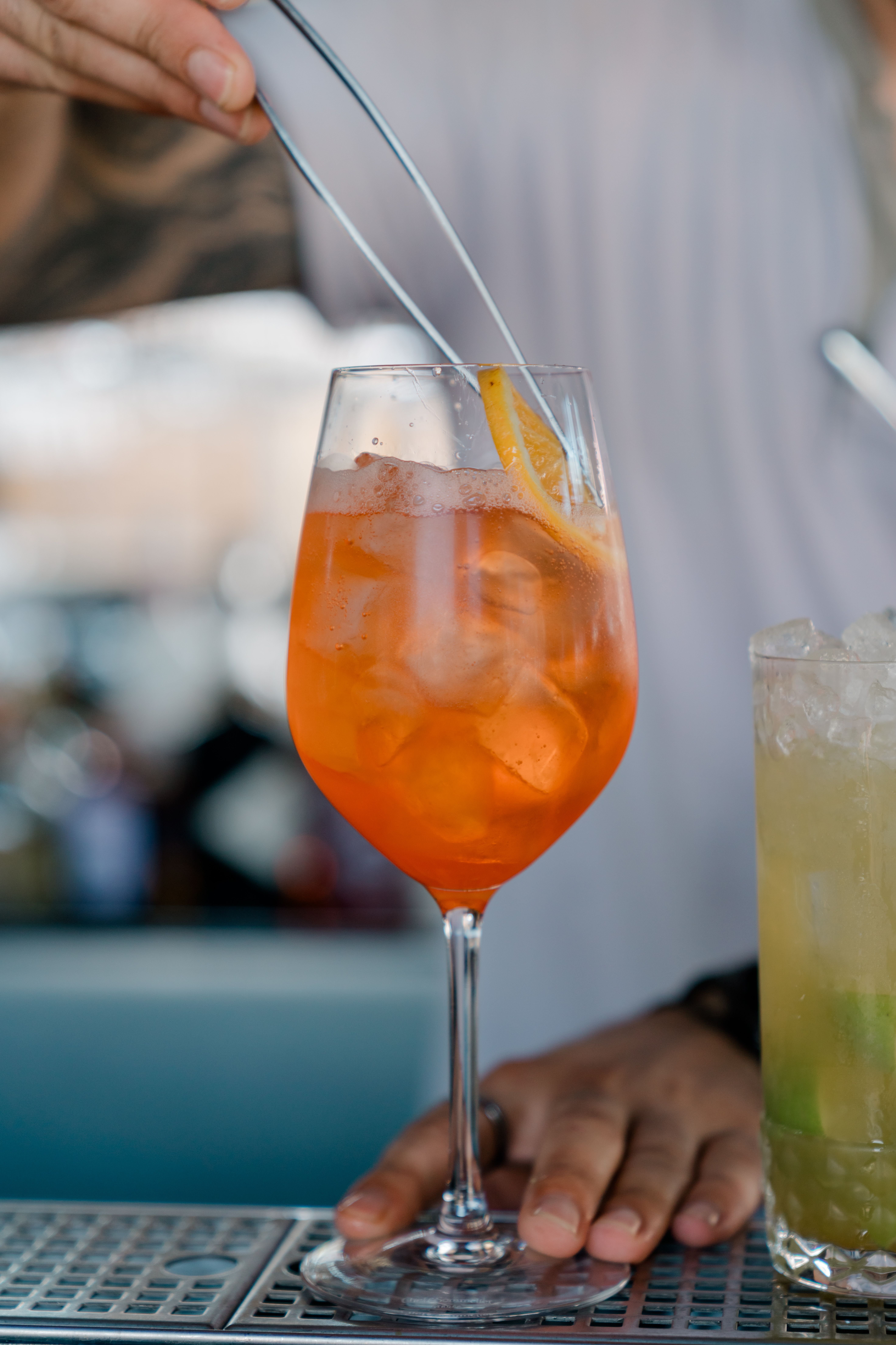Refreshing Aperol Spritz Cocktail Preparation · Free Stock Photo