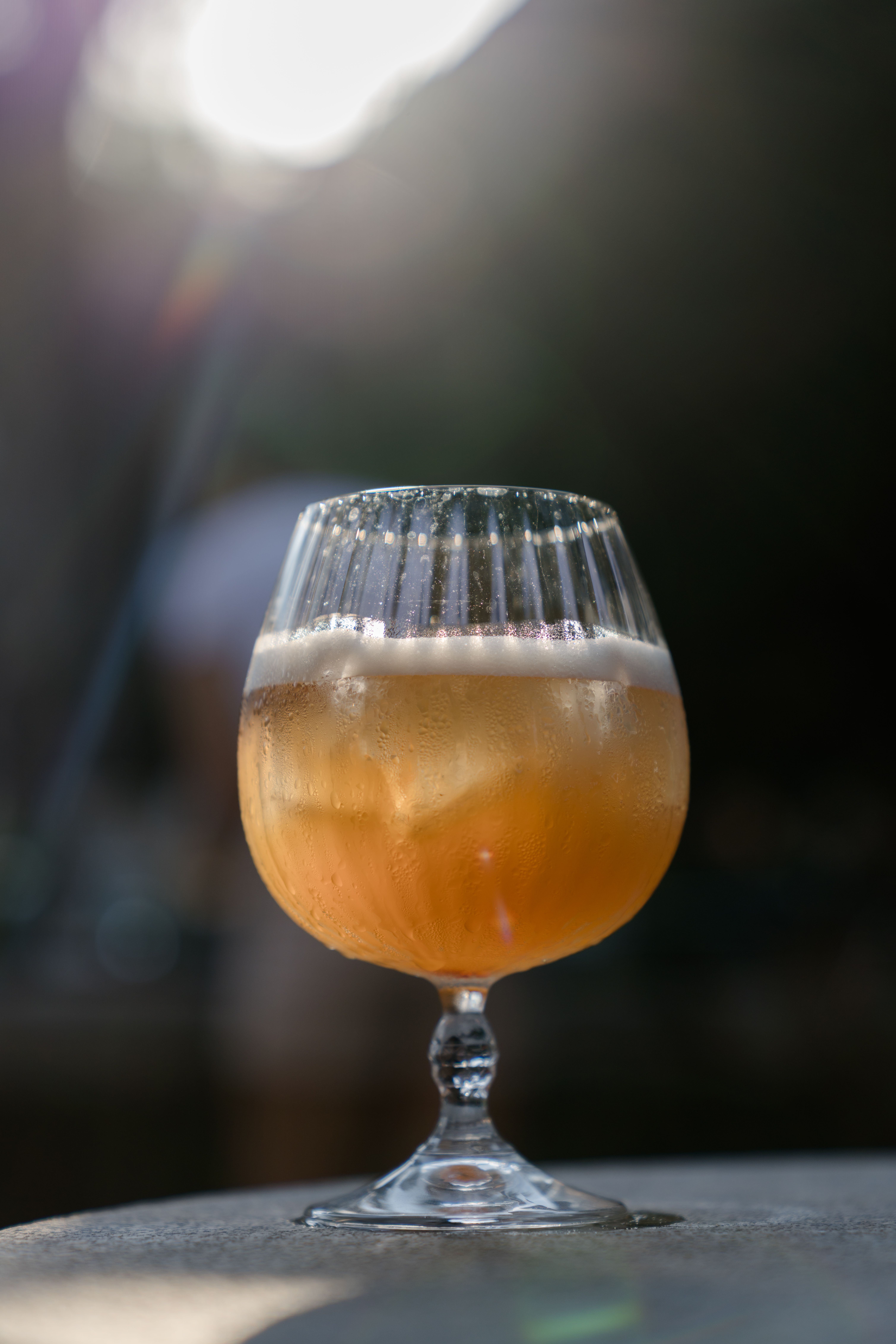 Refreshing Iced Beverage in Sunlight · Free Stock Photo