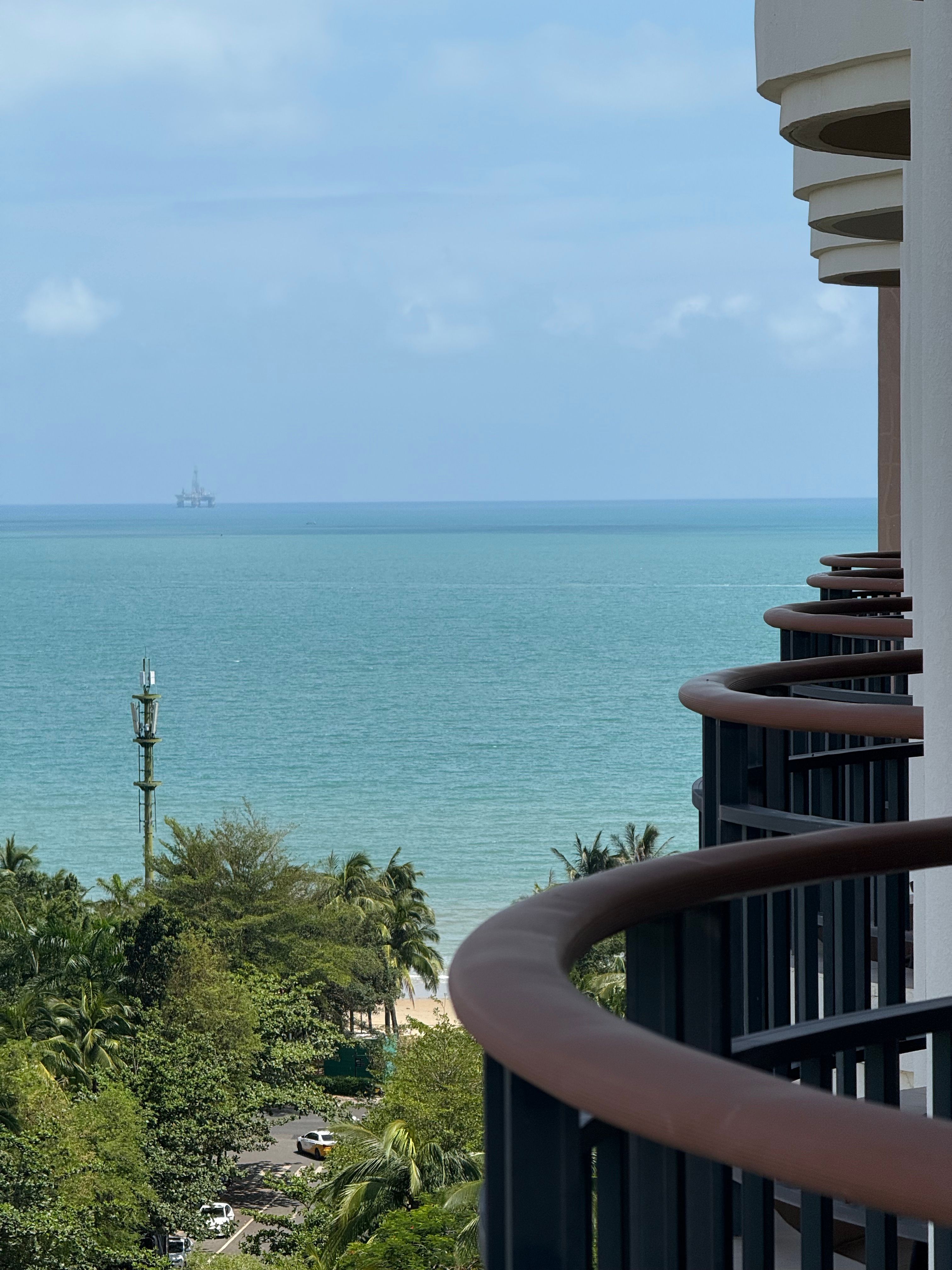Scenic Coastal View from Balcony Overlooking Sea · Free Stock Photo