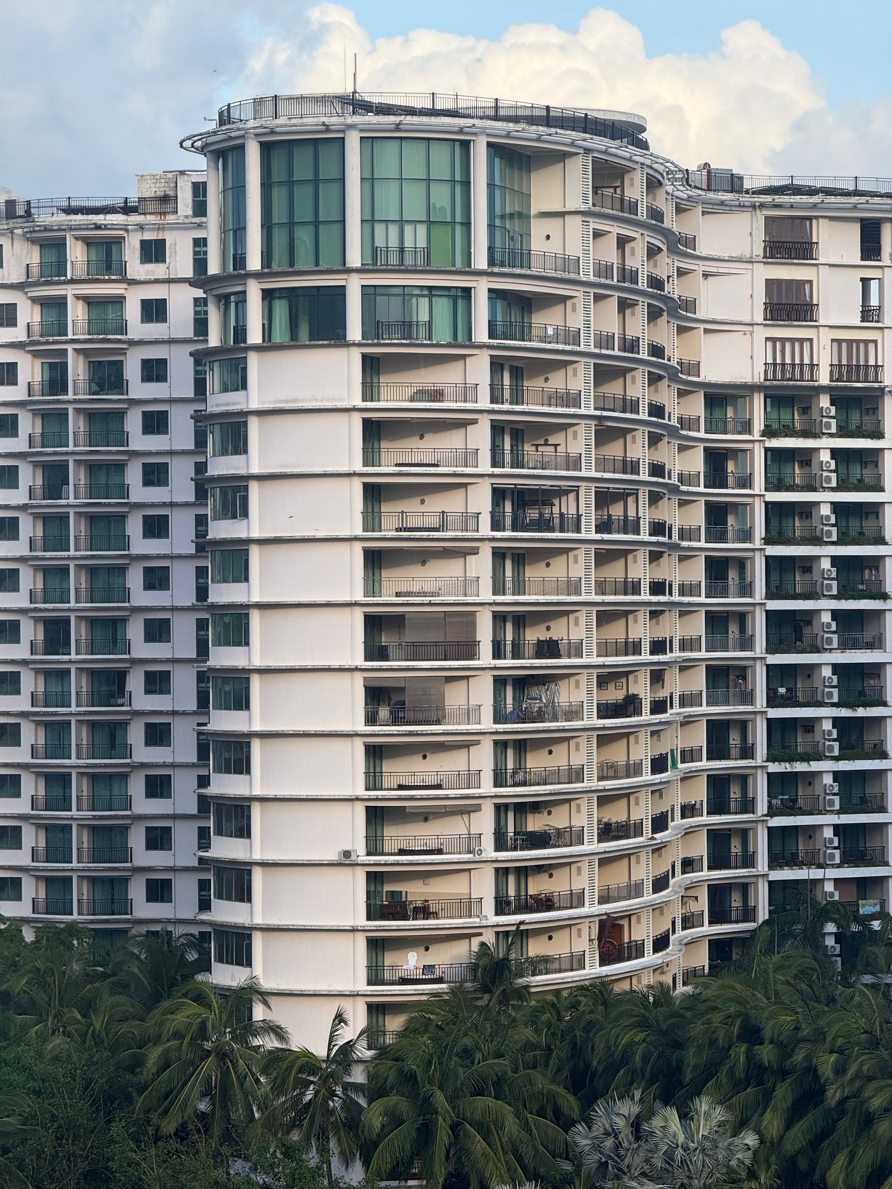 Modern High-Rise Apartment Building Exterior View · Free Stock Photo
