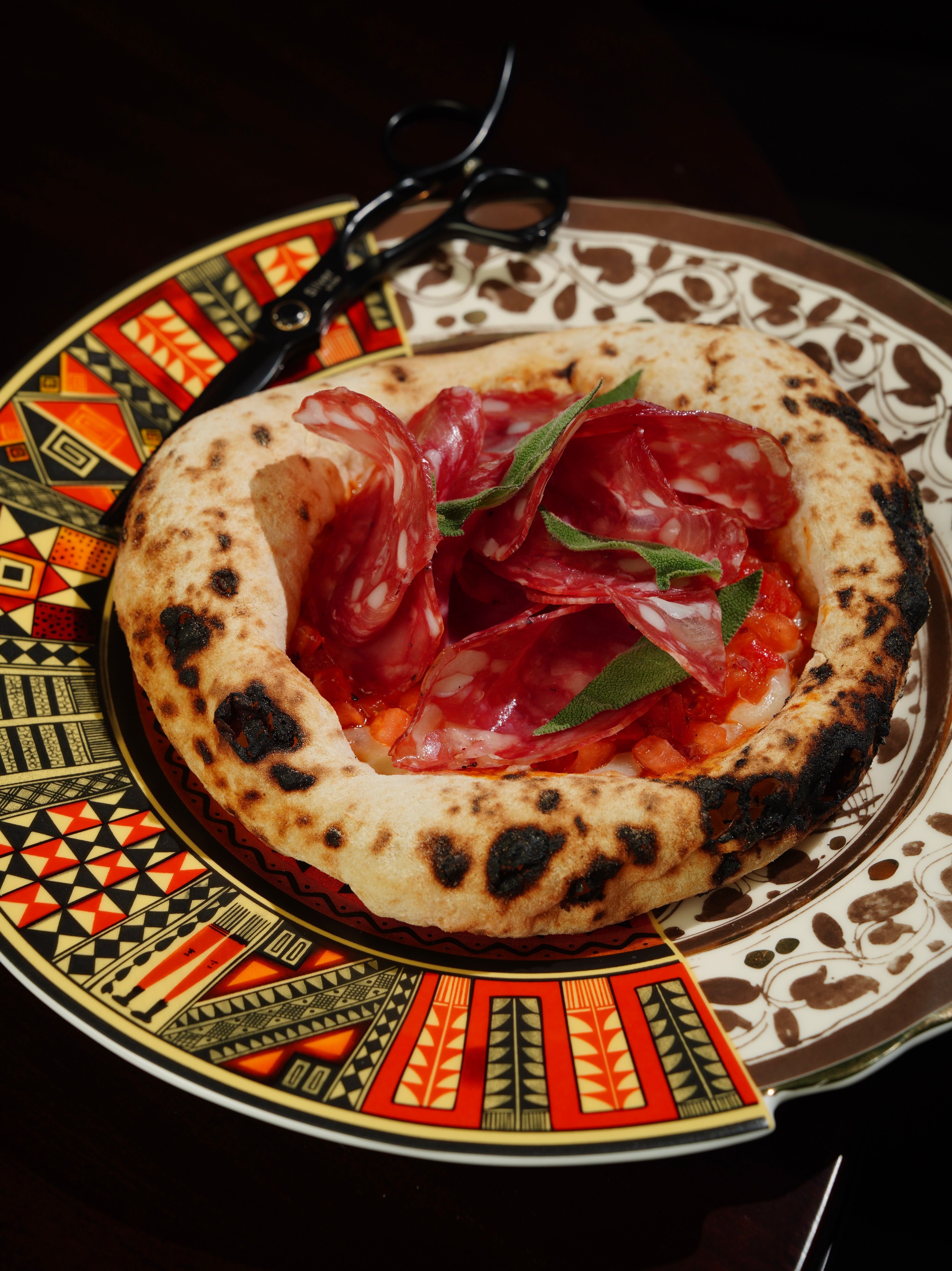 Delicious Gourmet Italian Pizza with Salami · Free Stock Photo