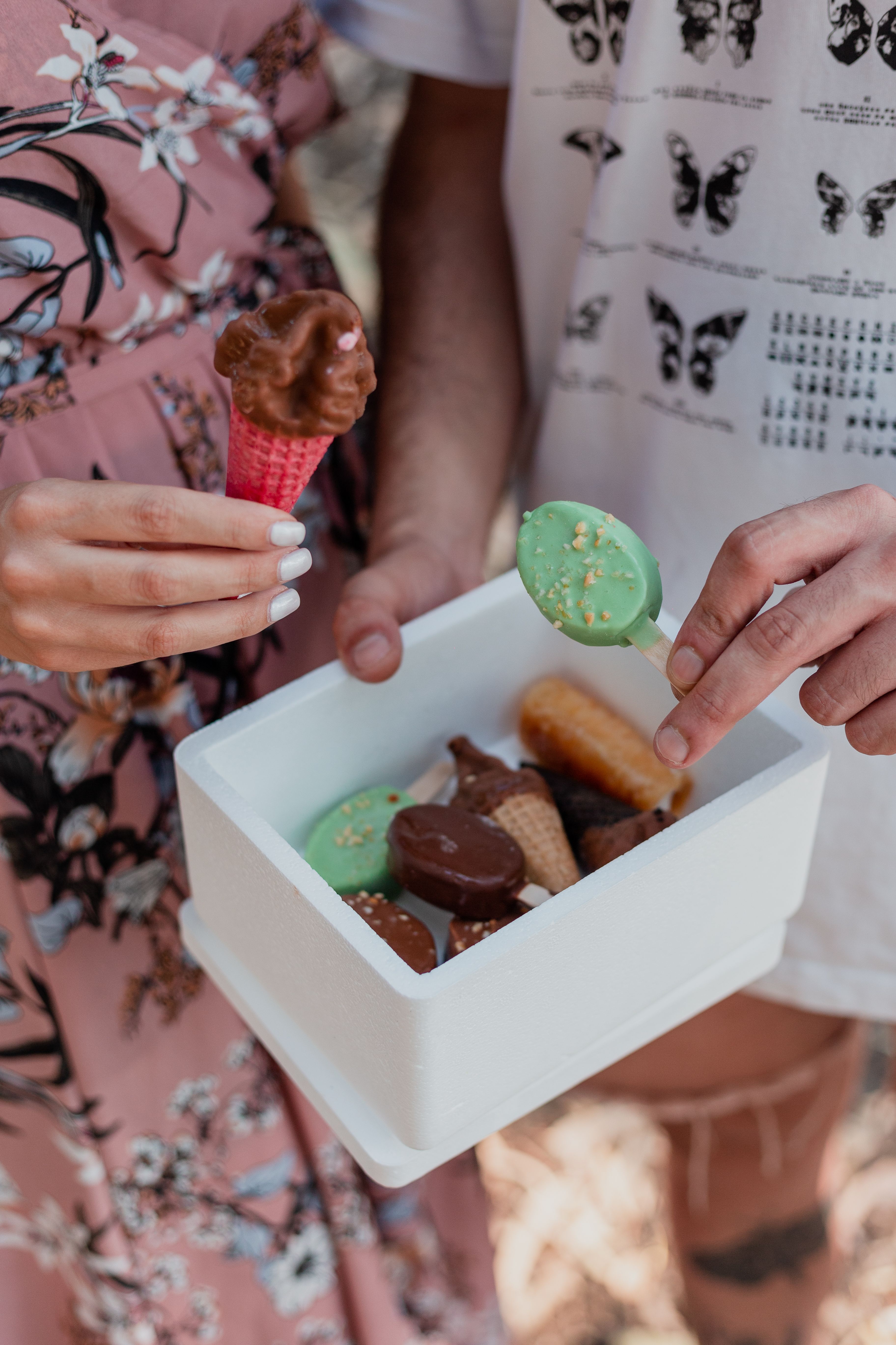 Couple Enjoying Ice Cream on a Sunny Day · Free Stock Photo