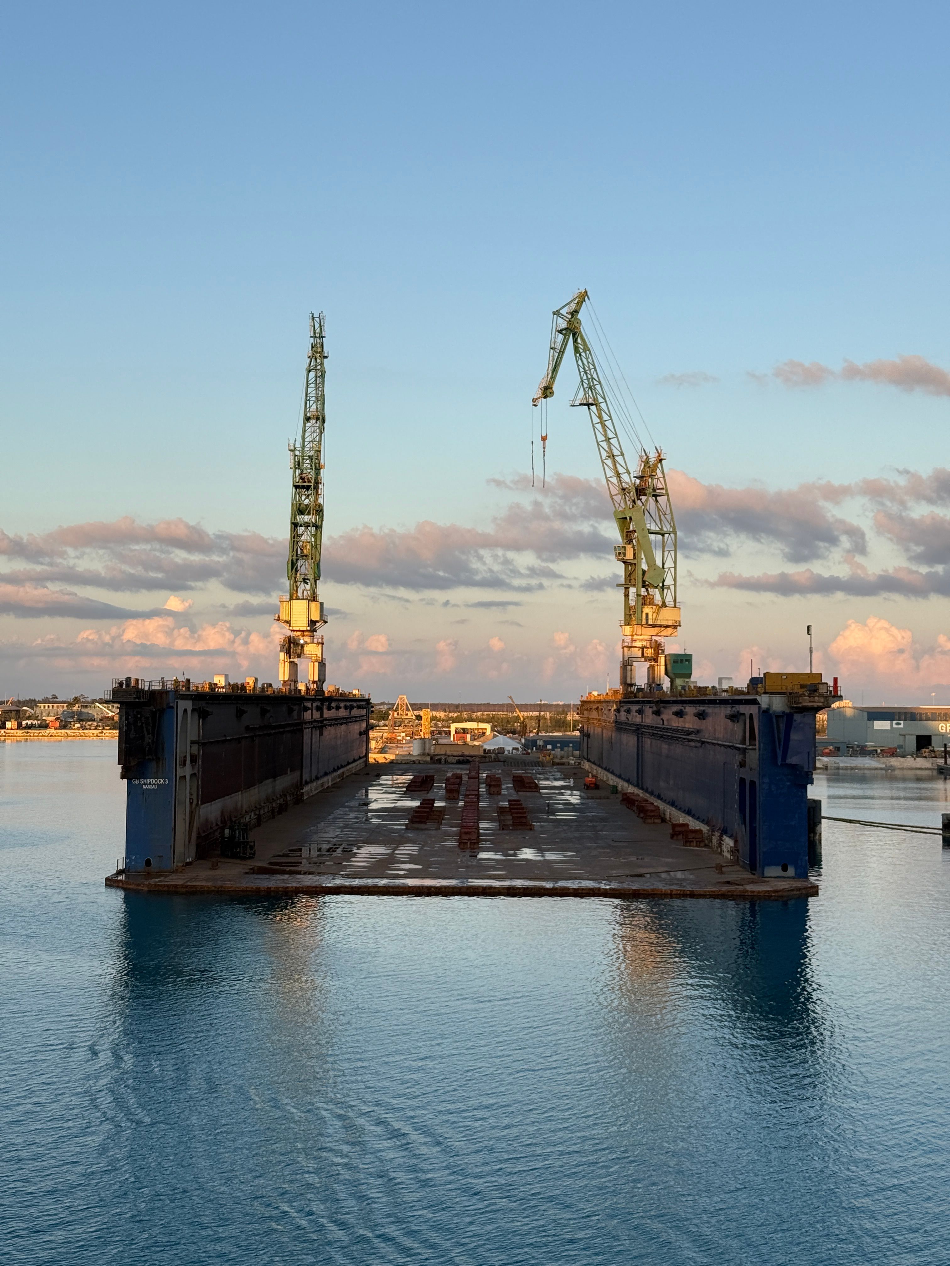 Floating Dock with Cranes in Port at Sunrise · Free Stock Photo