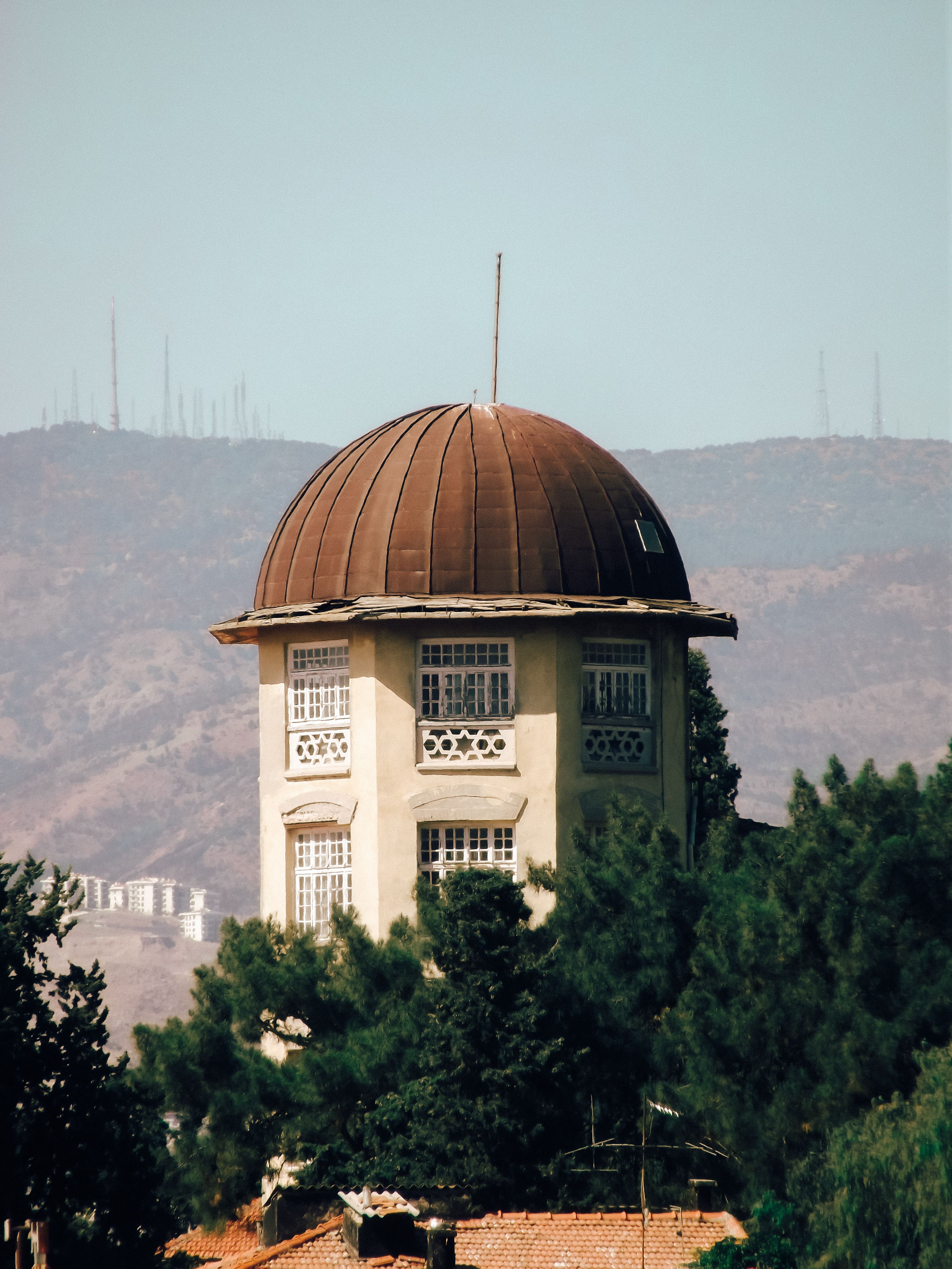 Historic Tower with Dome and Mountain View · Free Stock Photo