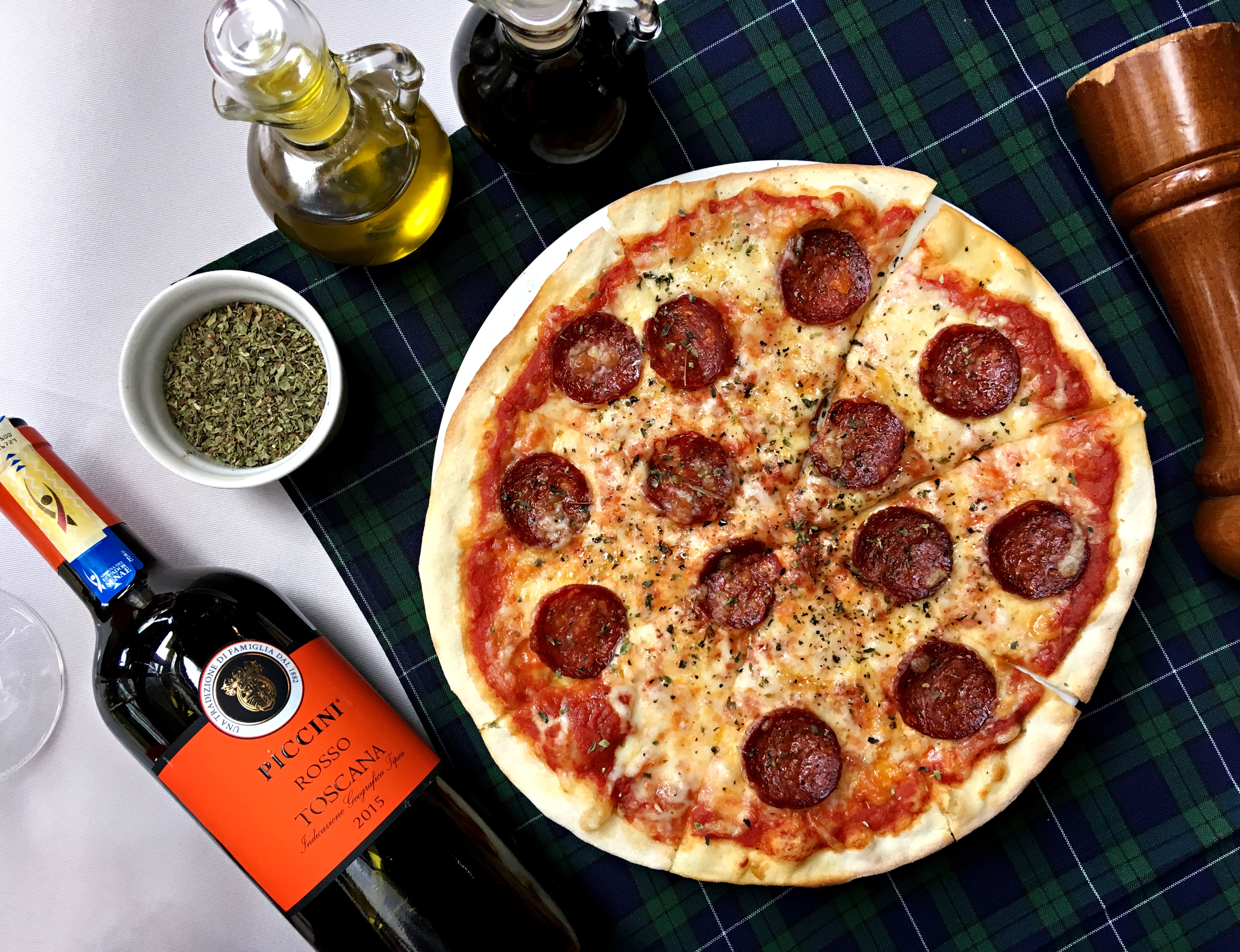 Delicious Pepperoni Pizza Flat Lay with Wine · Free Stock Photo