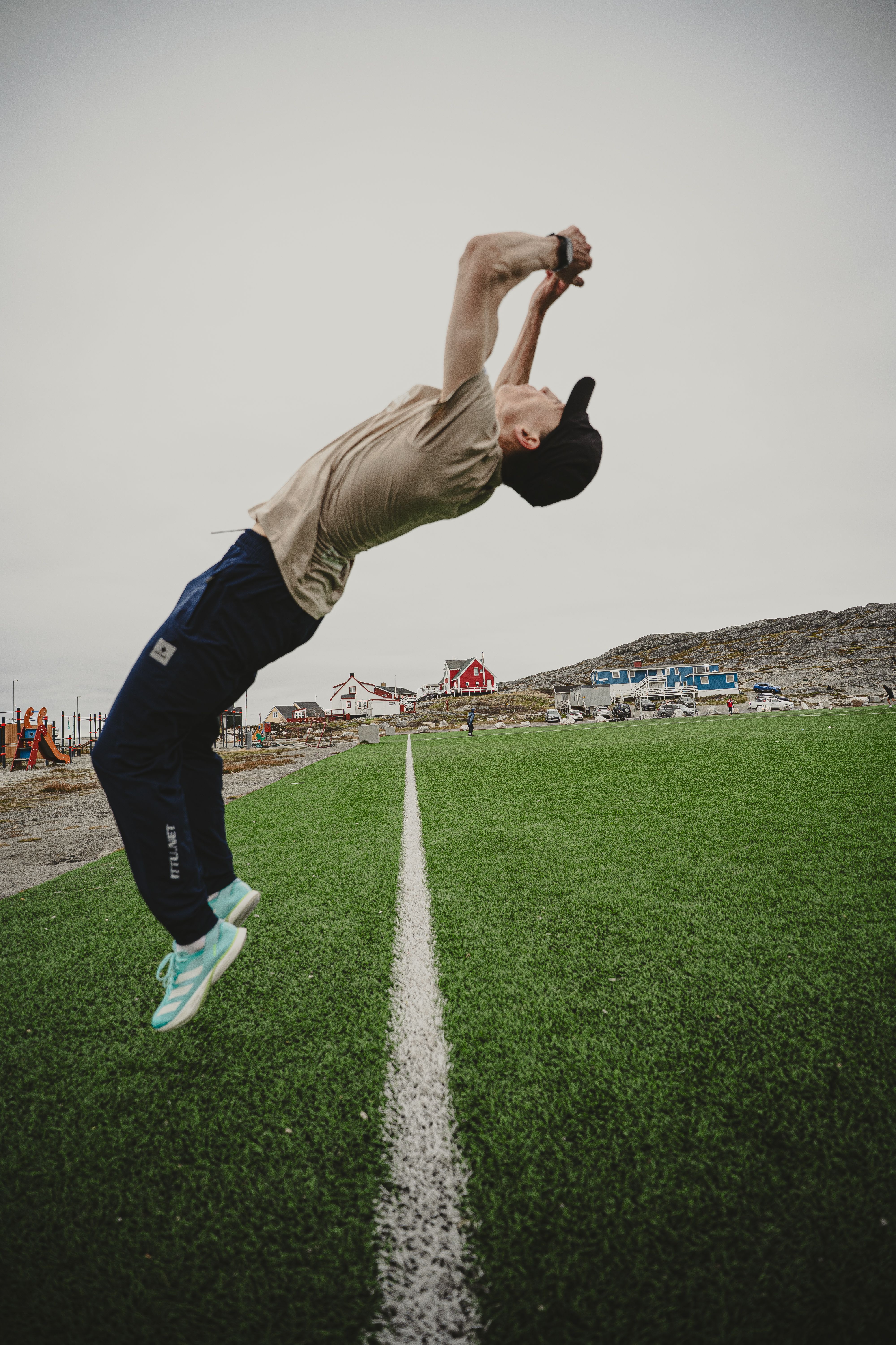 Dynamic Backflip on Greenland's Sport Field · Free Stock Photo
