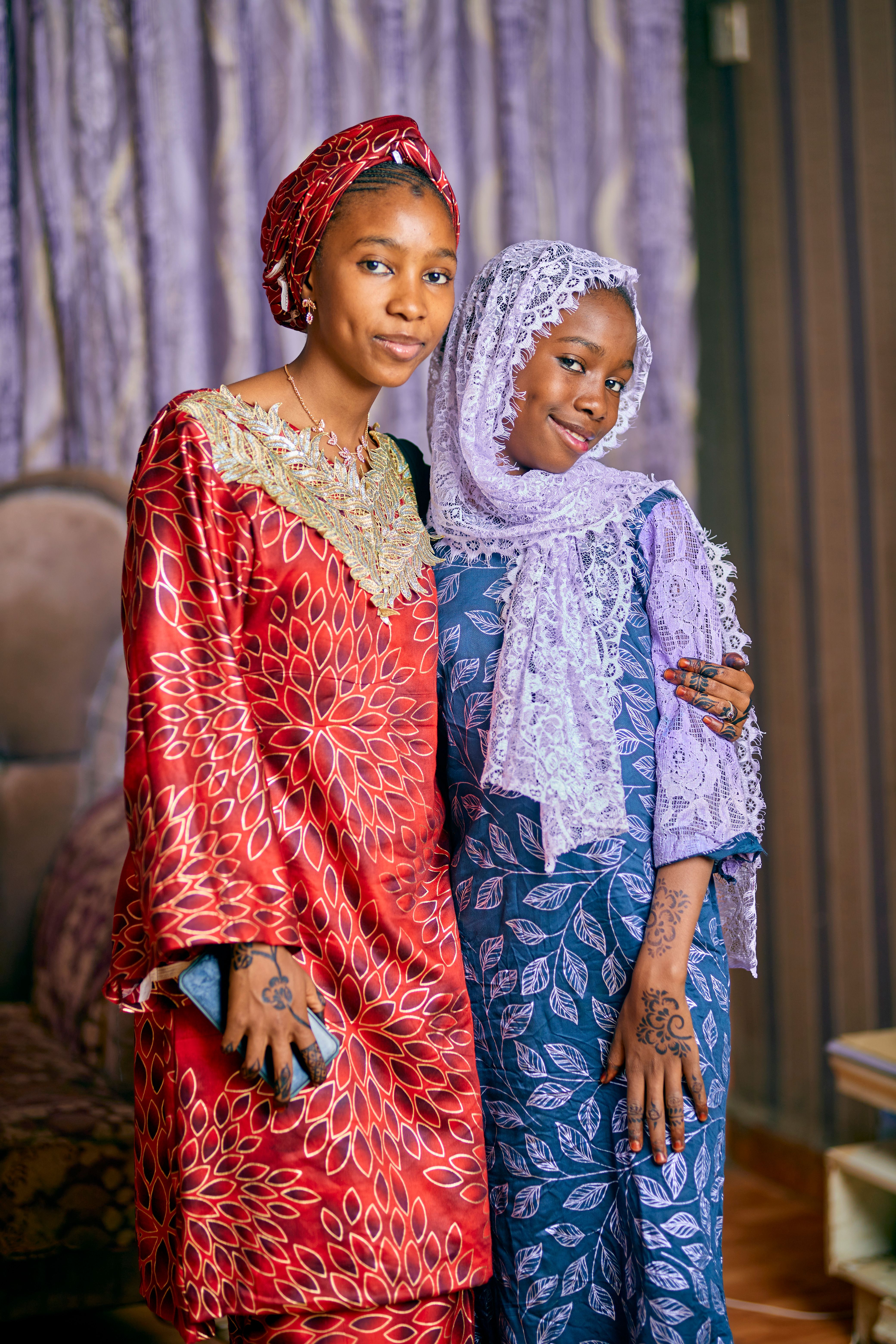 Mother and Child in Traditional Clothing · Free Stock Photo