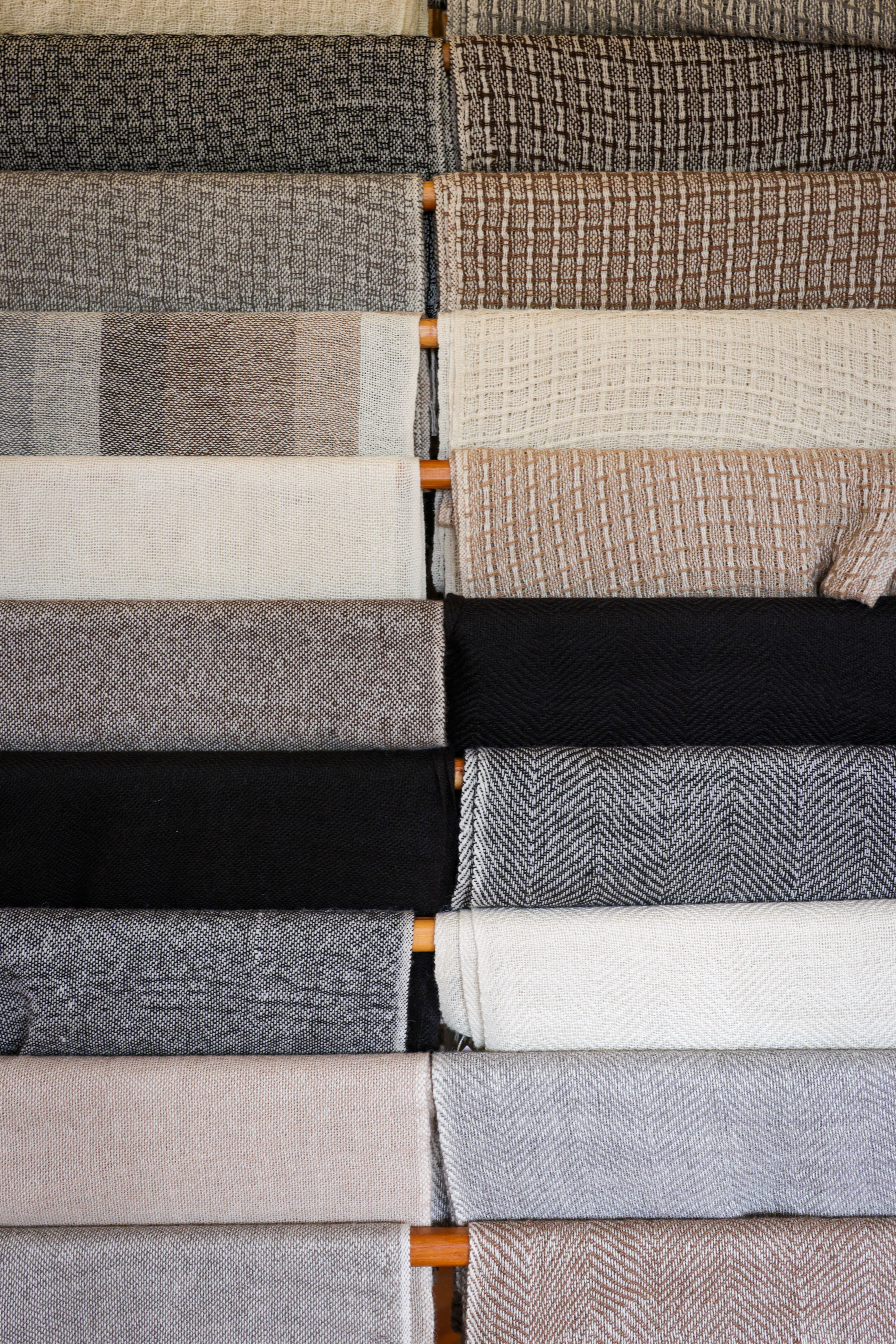 Layered Textile Display with Various Patterns · Free Stock Photo