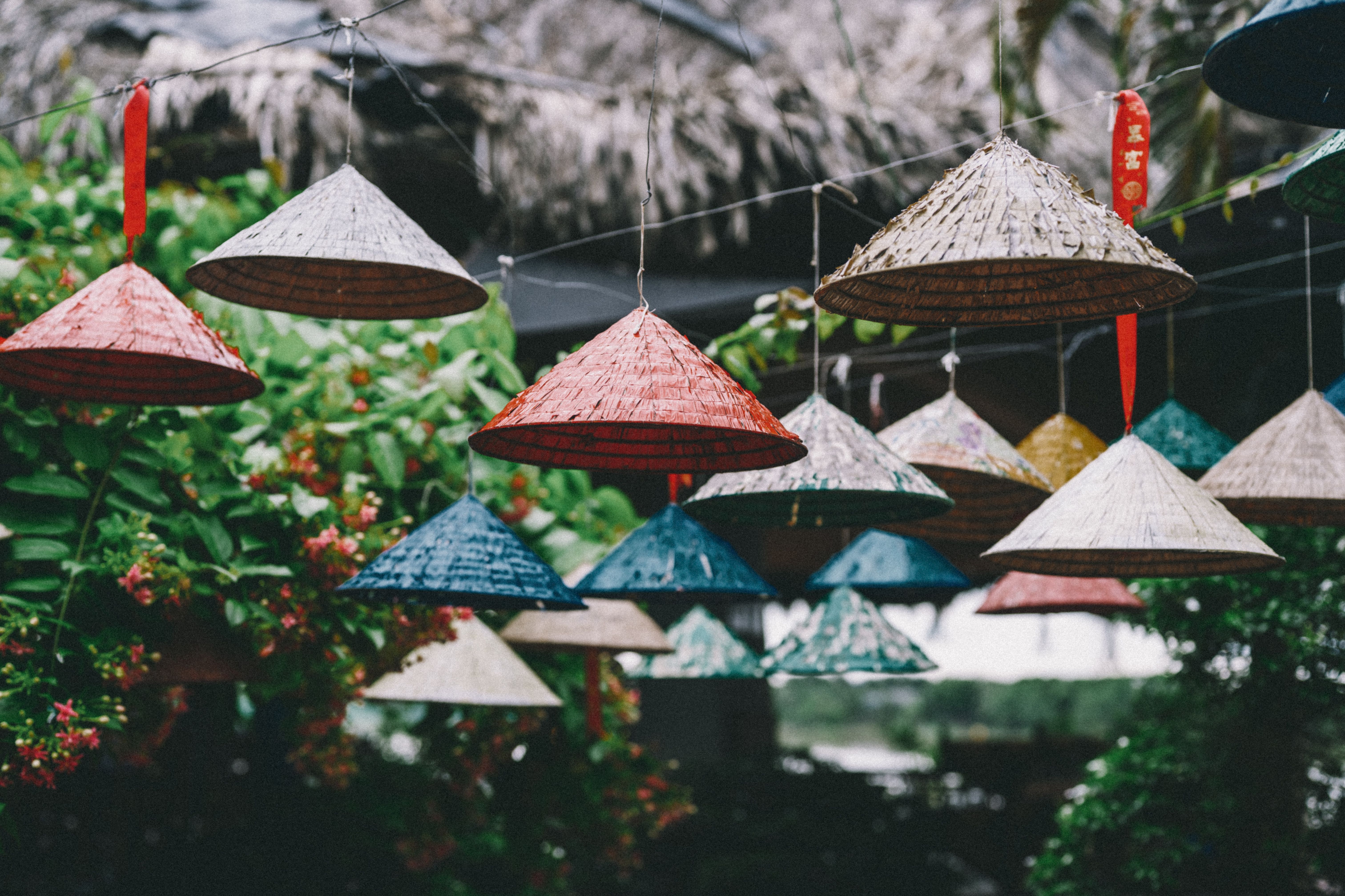 Colorful Traditional Hats Hanging in Bến Tre · Free Stock Photo