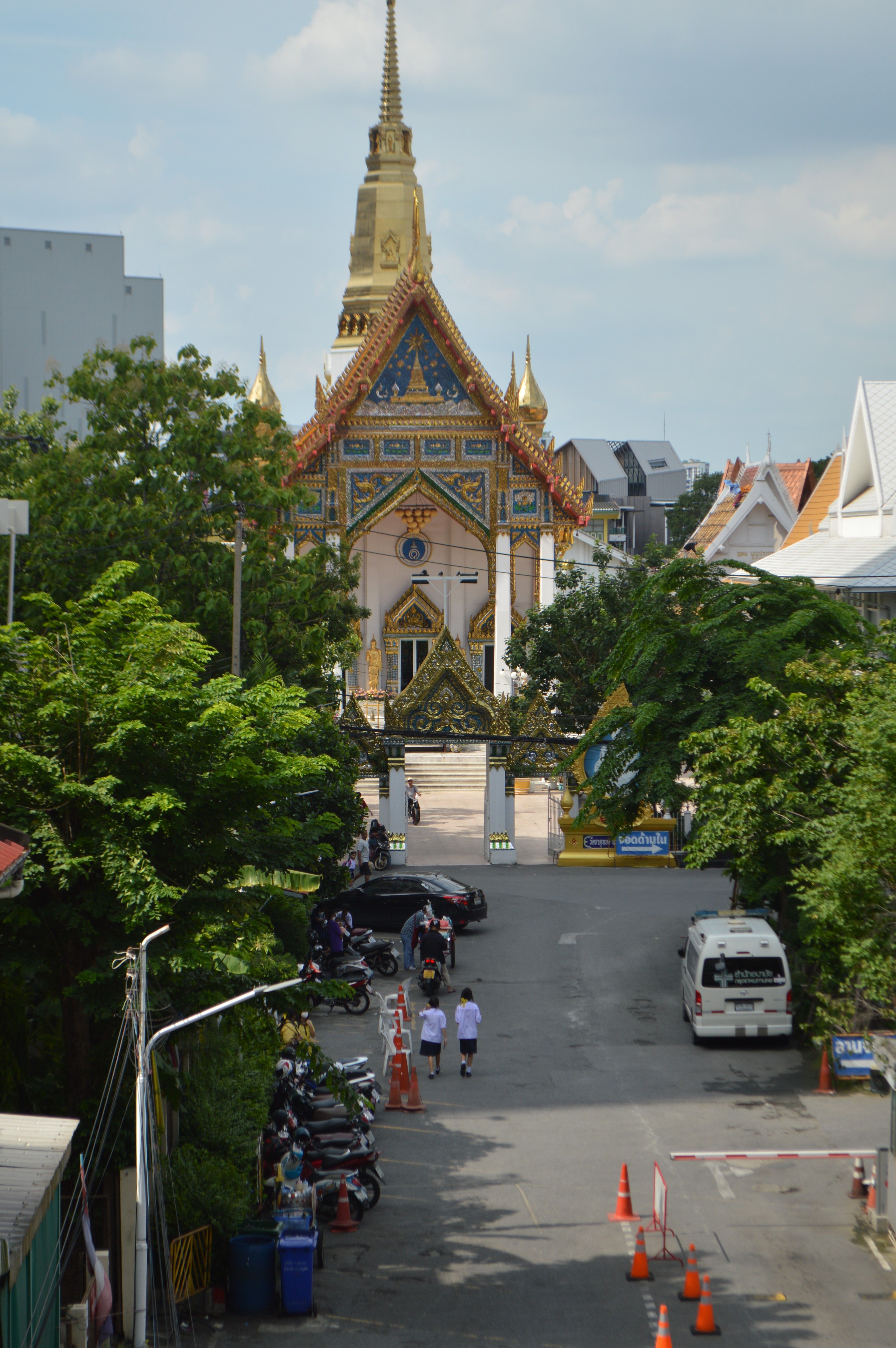 A Buddhist Temple Complex Framed By Urban Streets, Thailand Photos ...