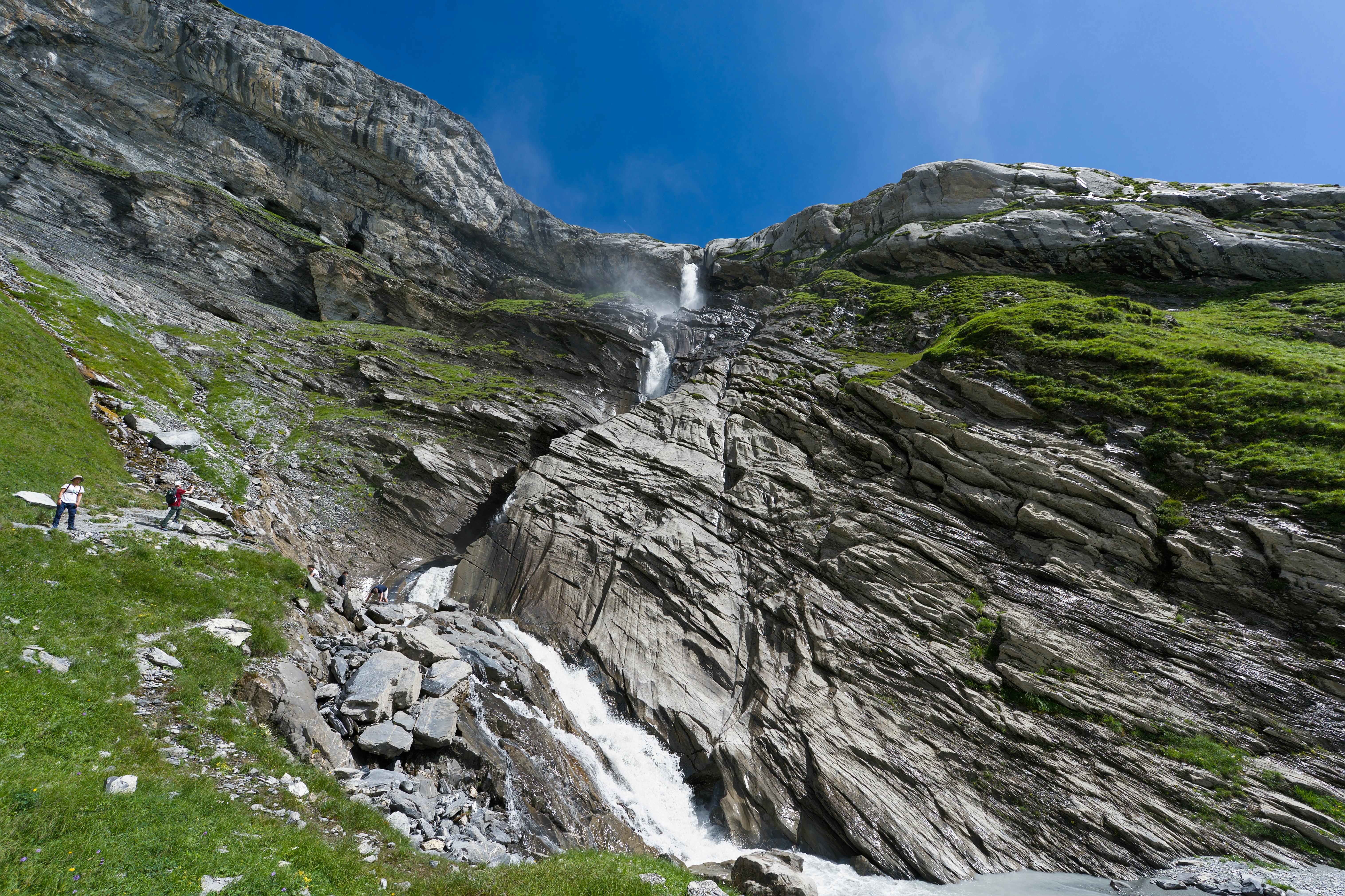 Hiking to the Majestic Swiss Waterfall · Free Stock Photo