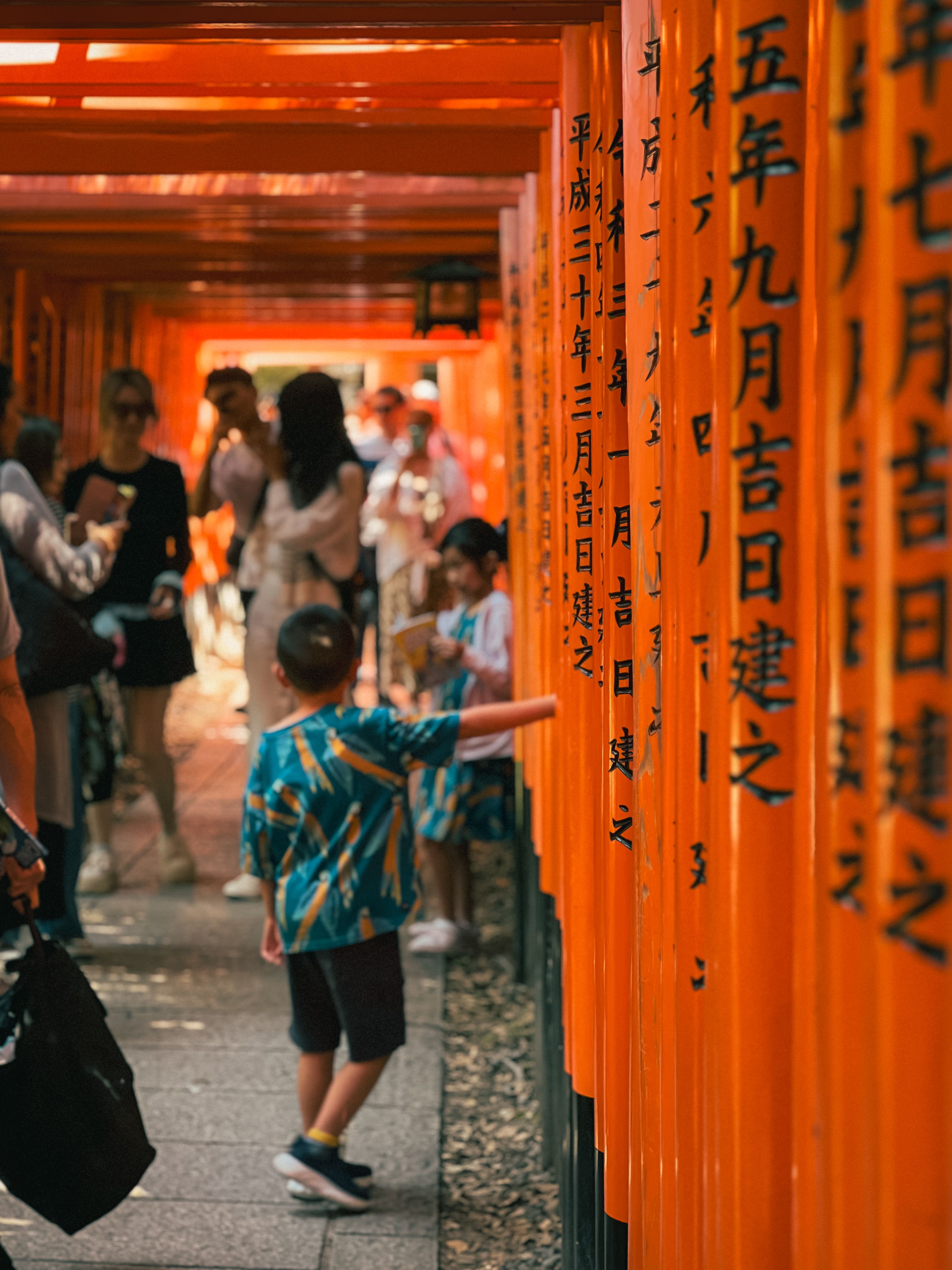 Visitors Explore Fushimi Inari Taisha Shrine Gates · Free Stock Photo