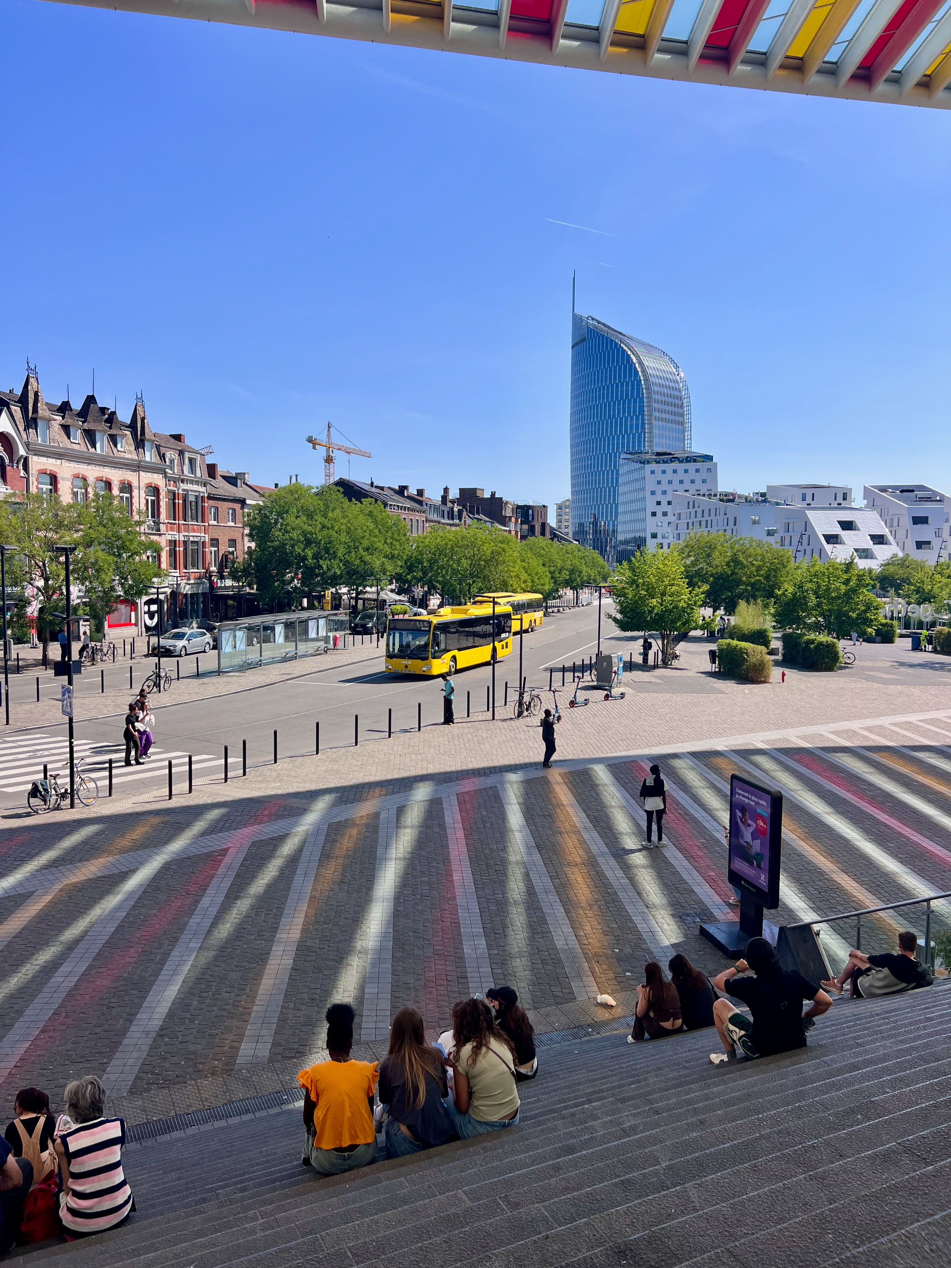 Colorful street scene in modern European city · Free Stock Photo