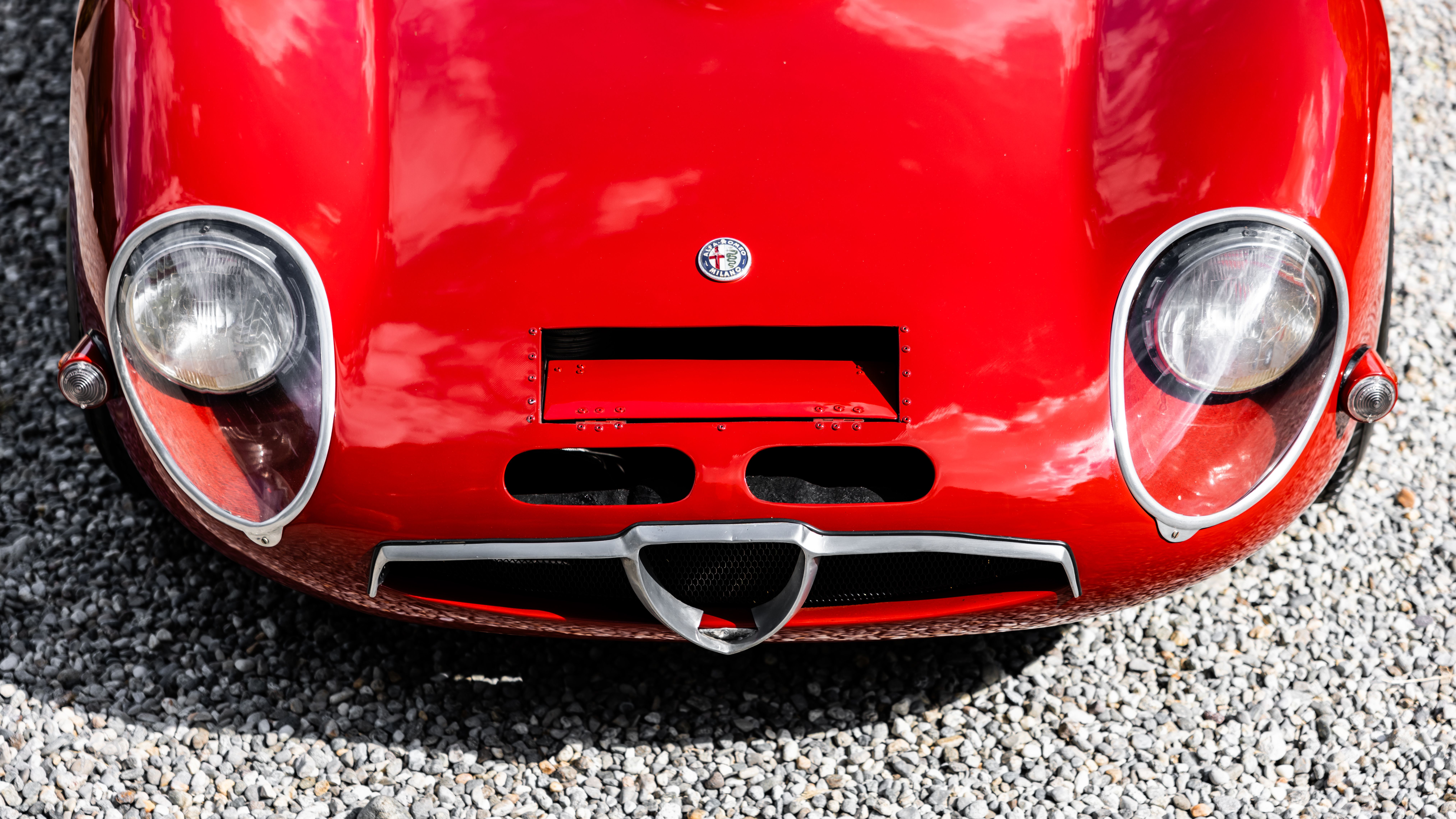 Classic Red Sports Car Front Close-Up · Free Stock Photo
